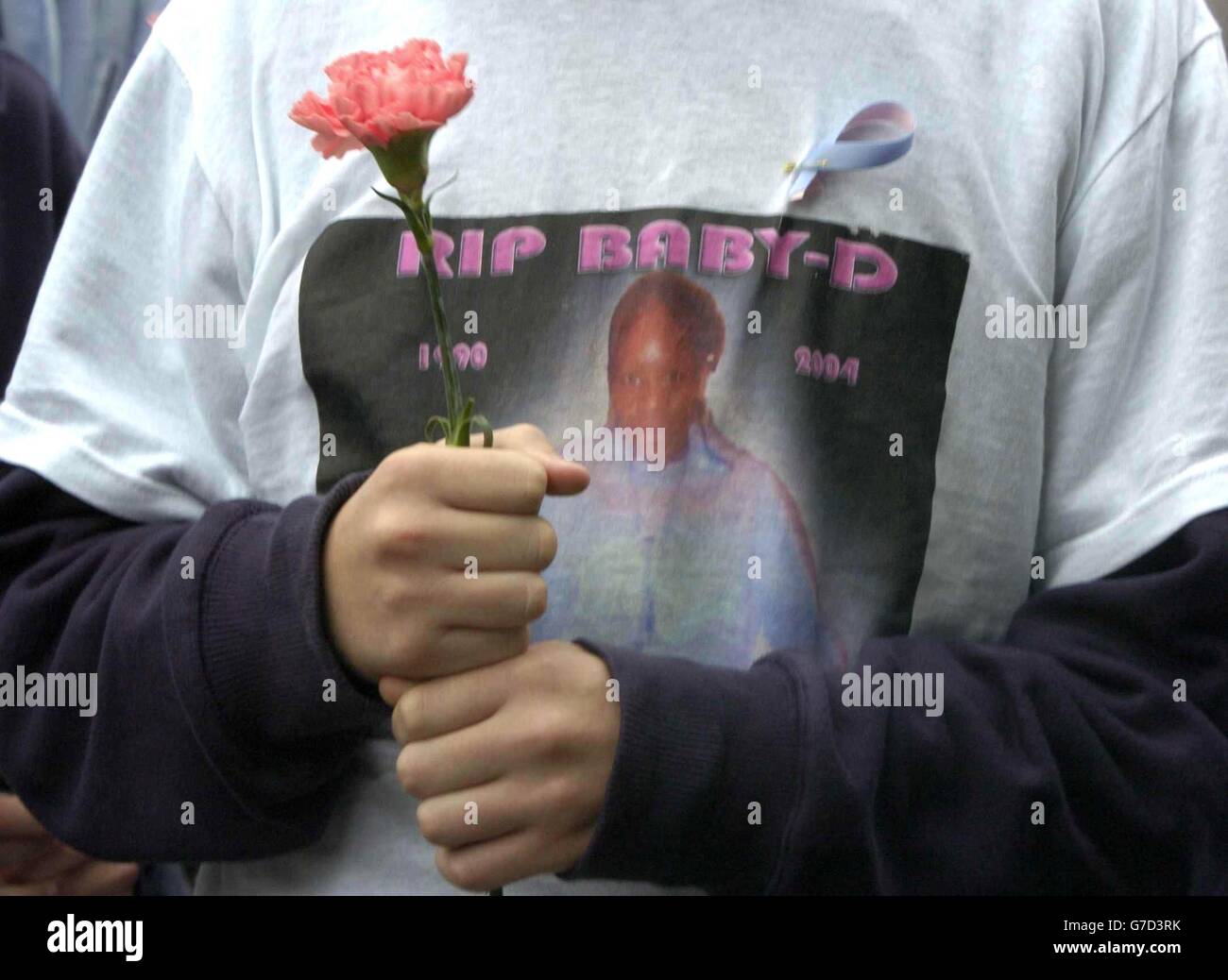 A mourner in the Old Market Square, Nottingham, during a minute's ...