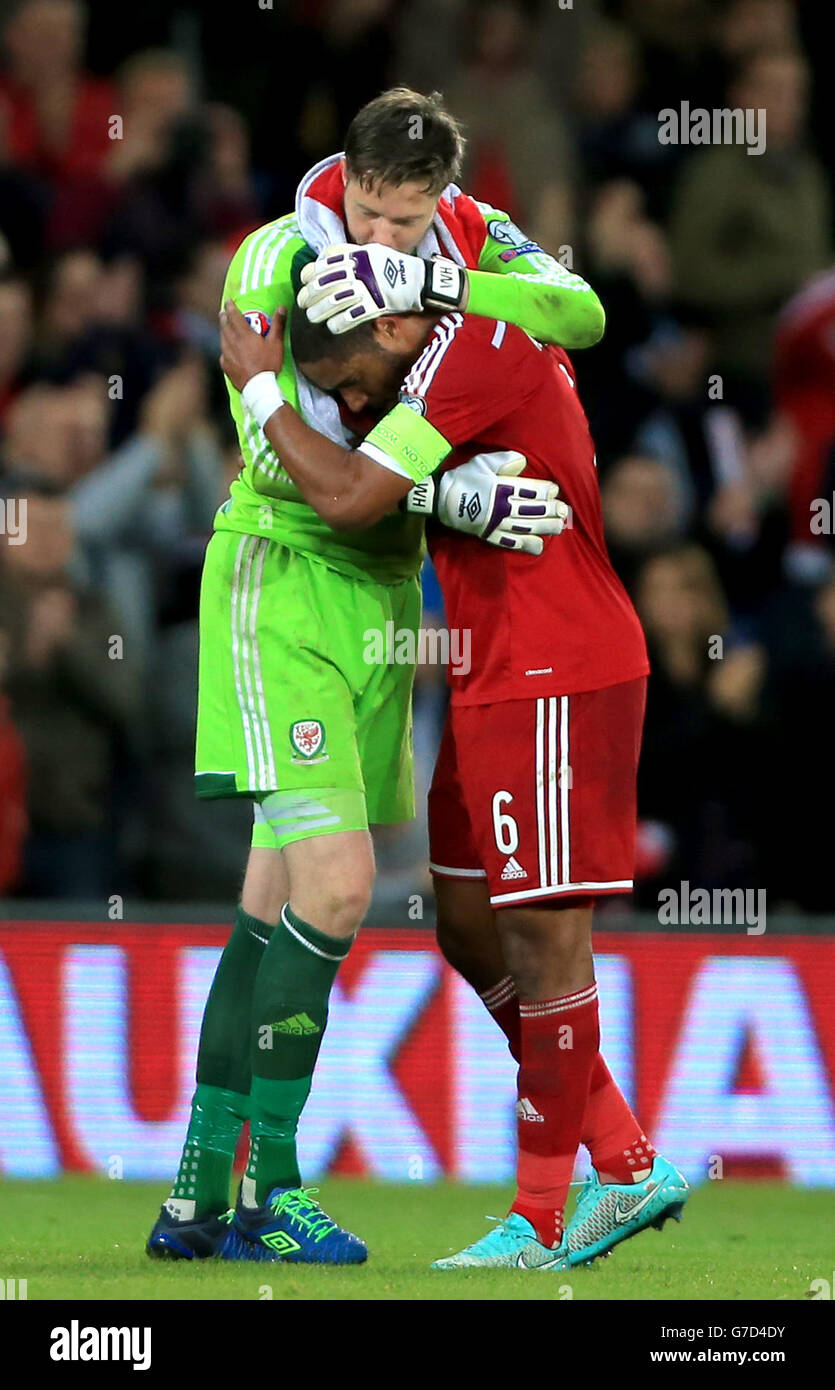 Wales' Ashley Williams (right) is consoled by goalkeeper Wayne ...