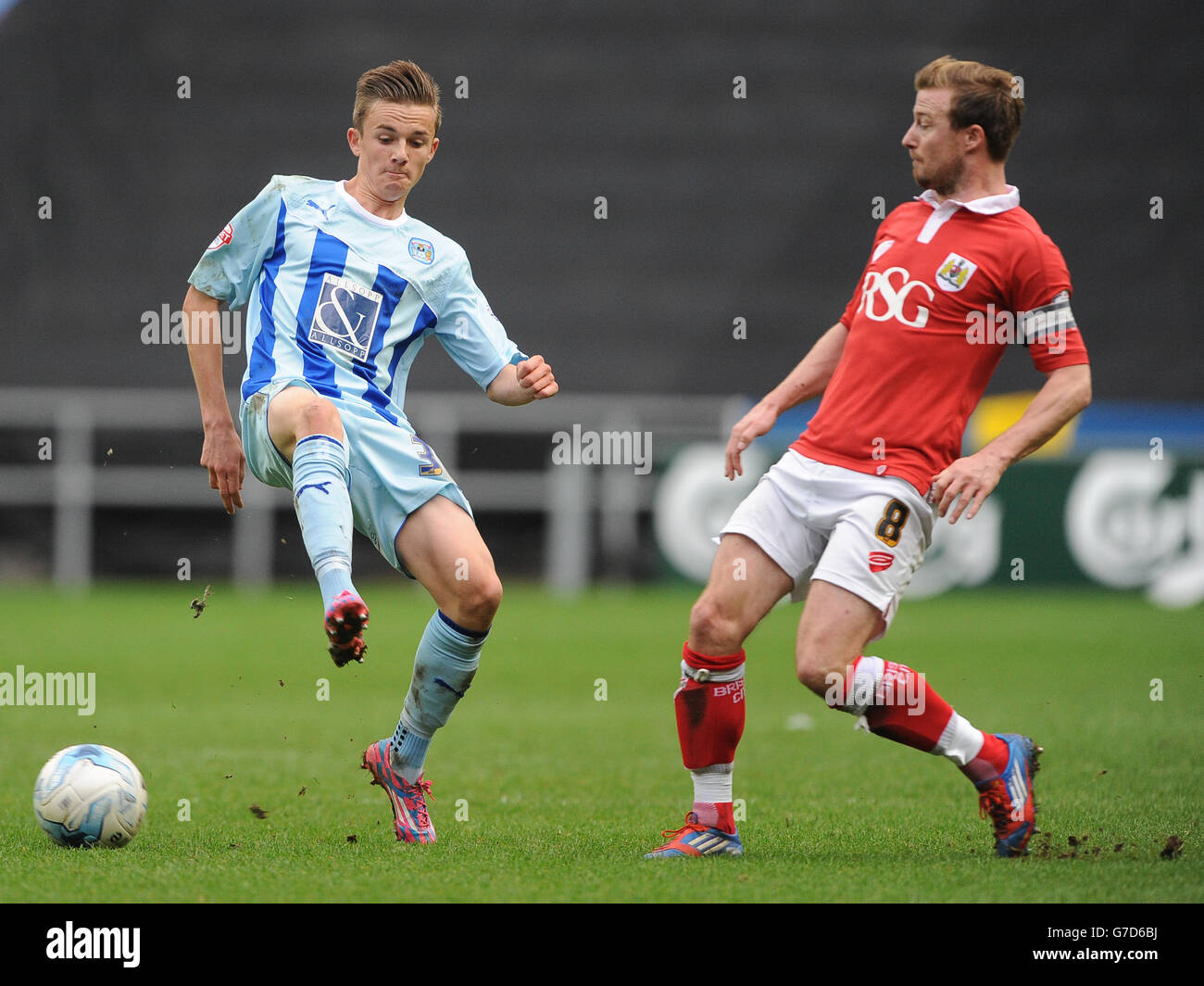 Coventry City's James Maddison (left) and Bristol City's Wade Elliott ...