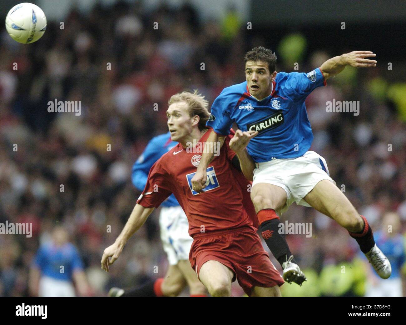 Rangers's Nacho Novo challenges Aberdeen's Russell Anderson during the ...