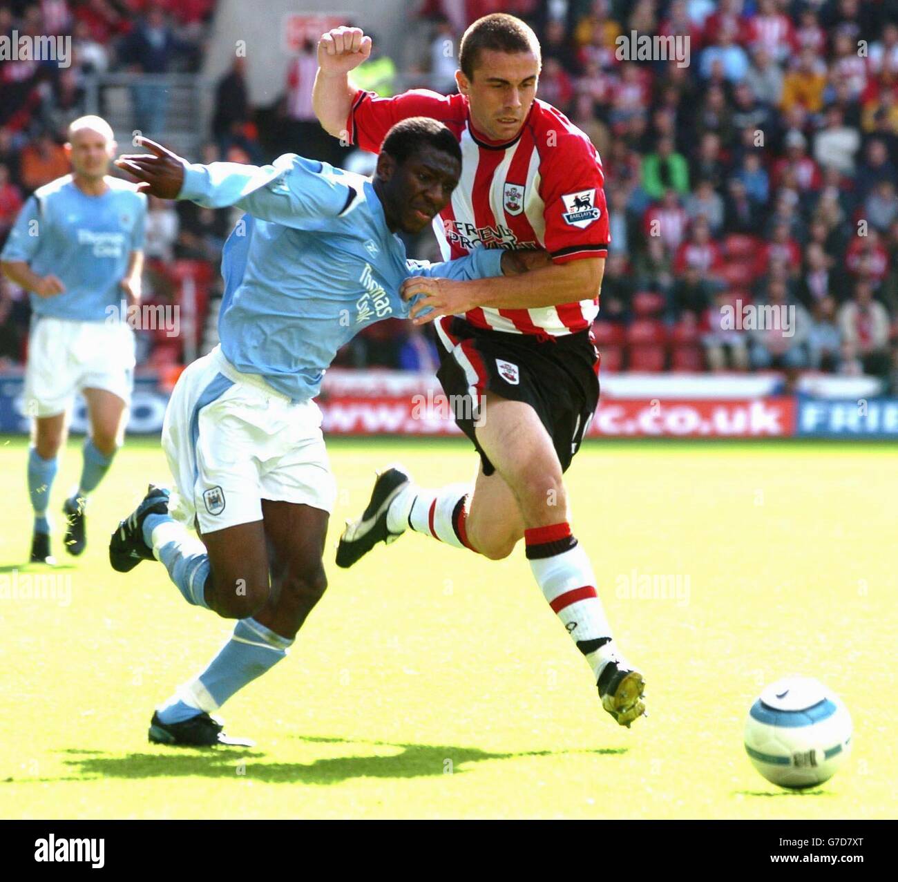 Southampton's David Prutton (right) tussles with Manchester City's ...