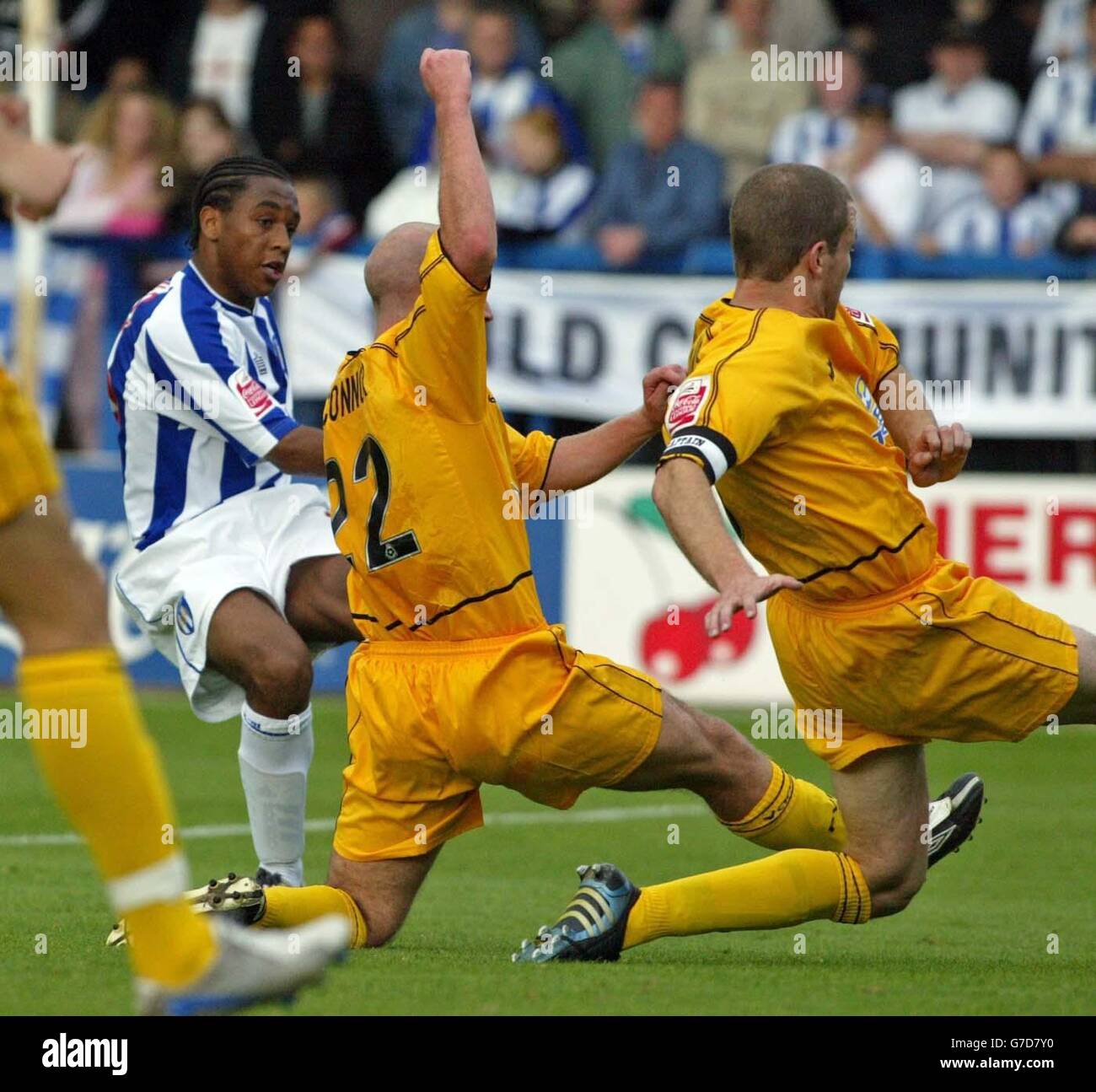 Neil Danns scores Colchester's second goal during their Coca-Cola ...