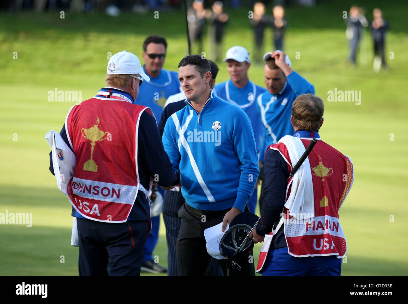 Europe's Justin Rose shakes hand with caddy Damon Green after winning ...