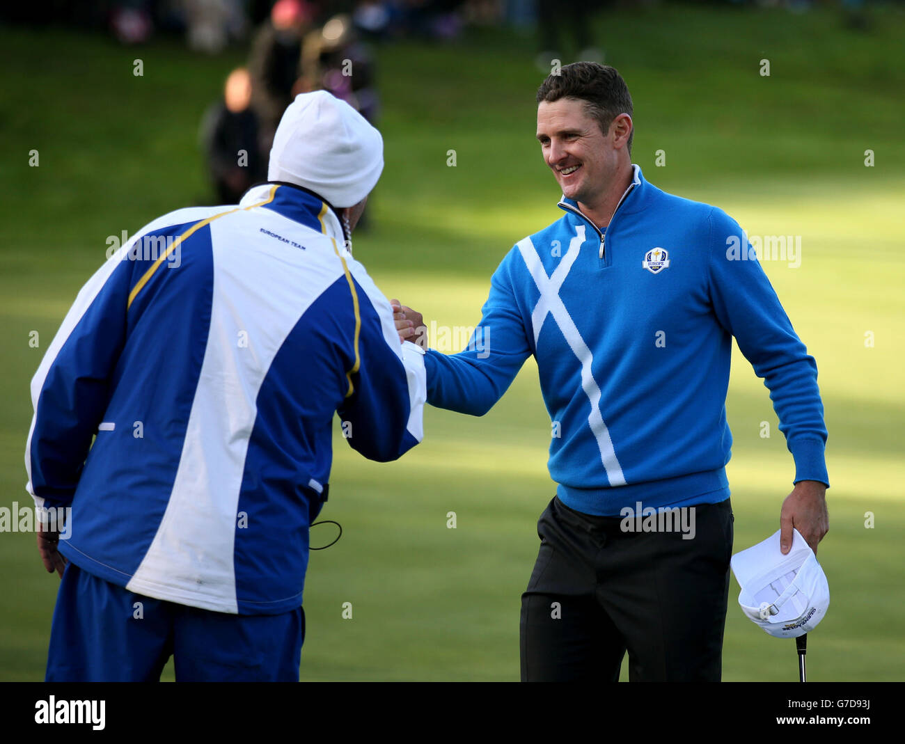 Europe's Justin Rose (centre) and Henrik Stenson (right) celebrate with ...