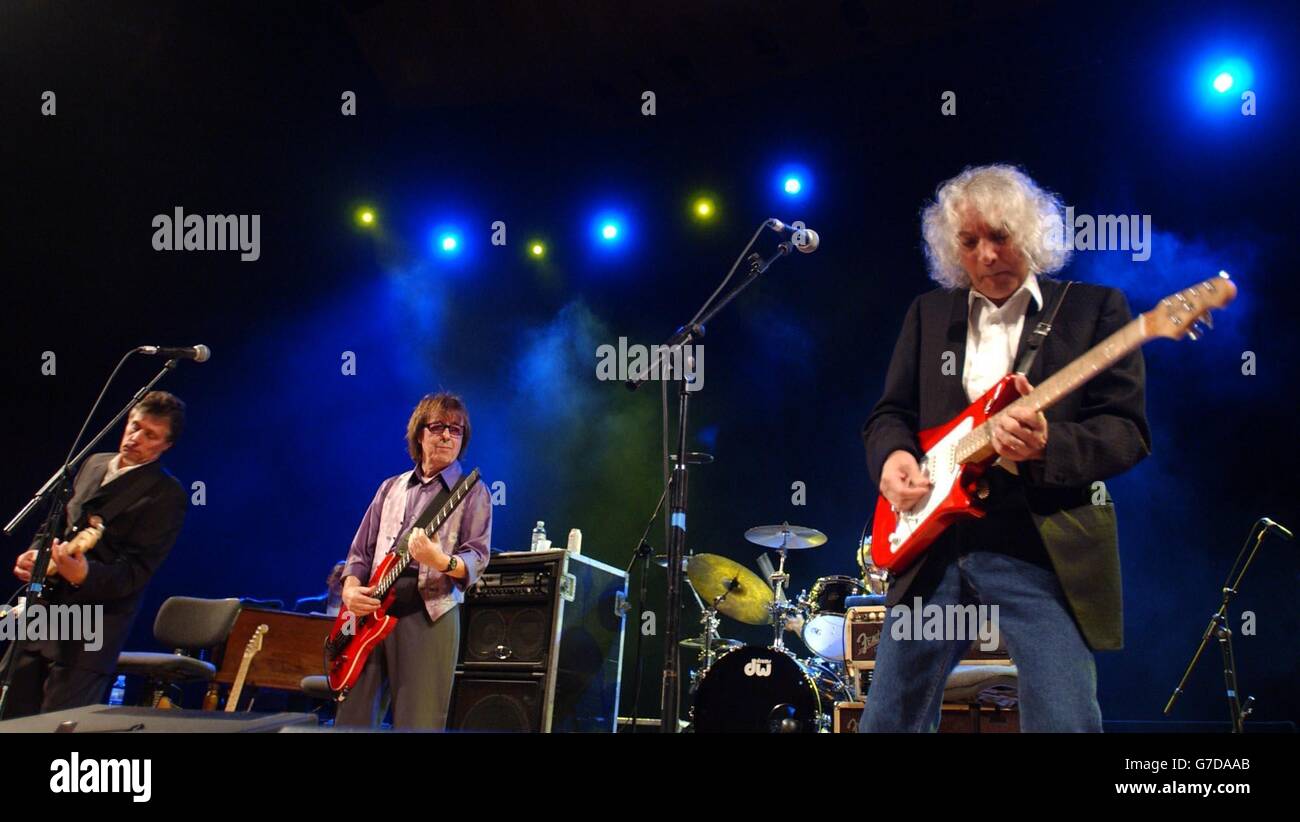 Bill Wyman (centre) performs live on stage with his band, The Rhythm ...