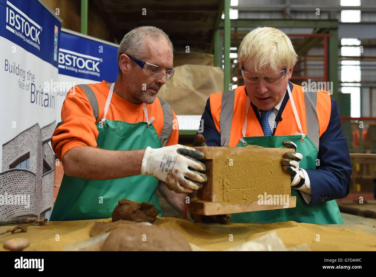 Mayor of London Boris Johnson makes his own brick with specials ...