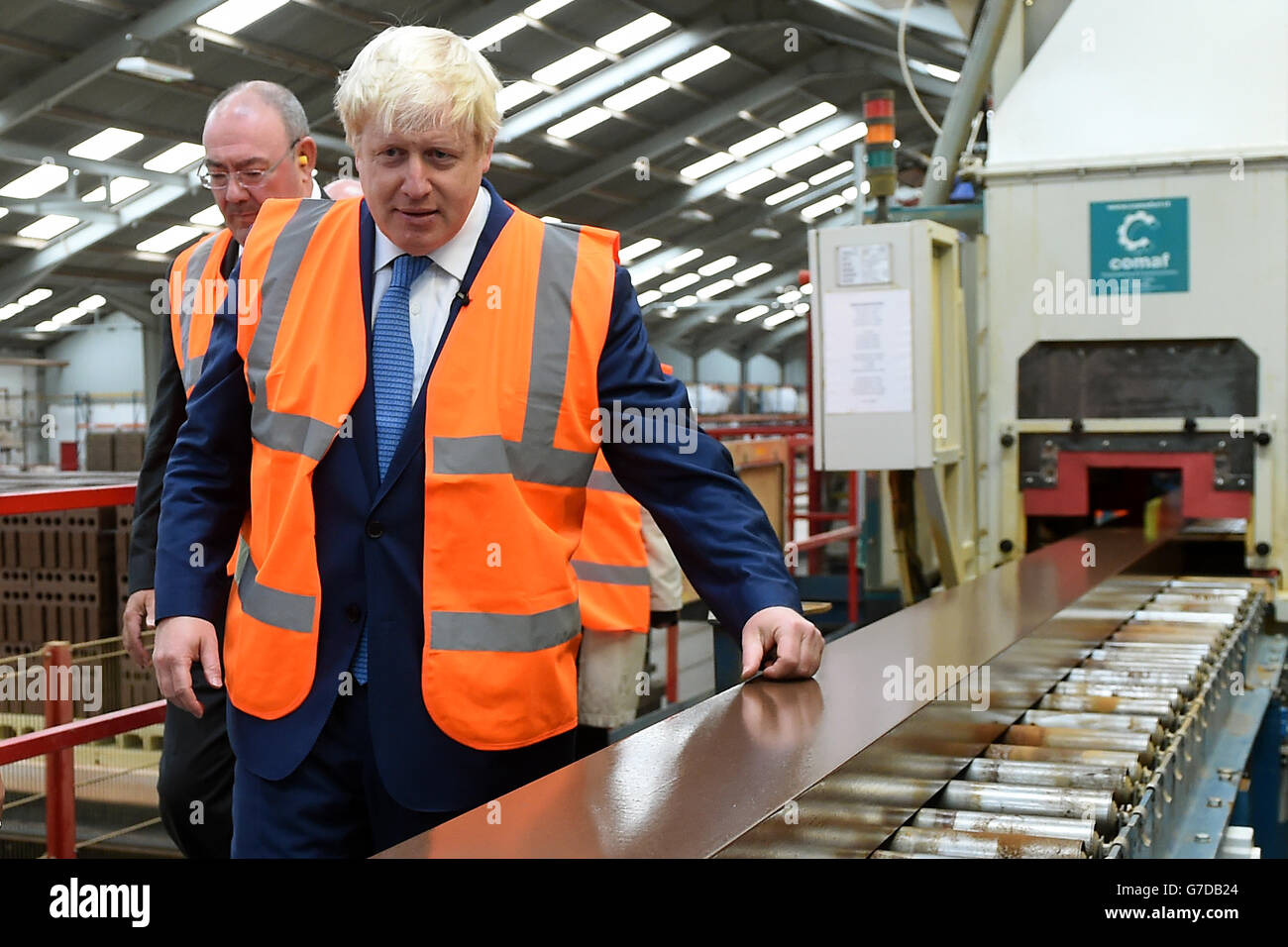 Mayor of London Boris Johnson views unfired brick ready for cutting ...