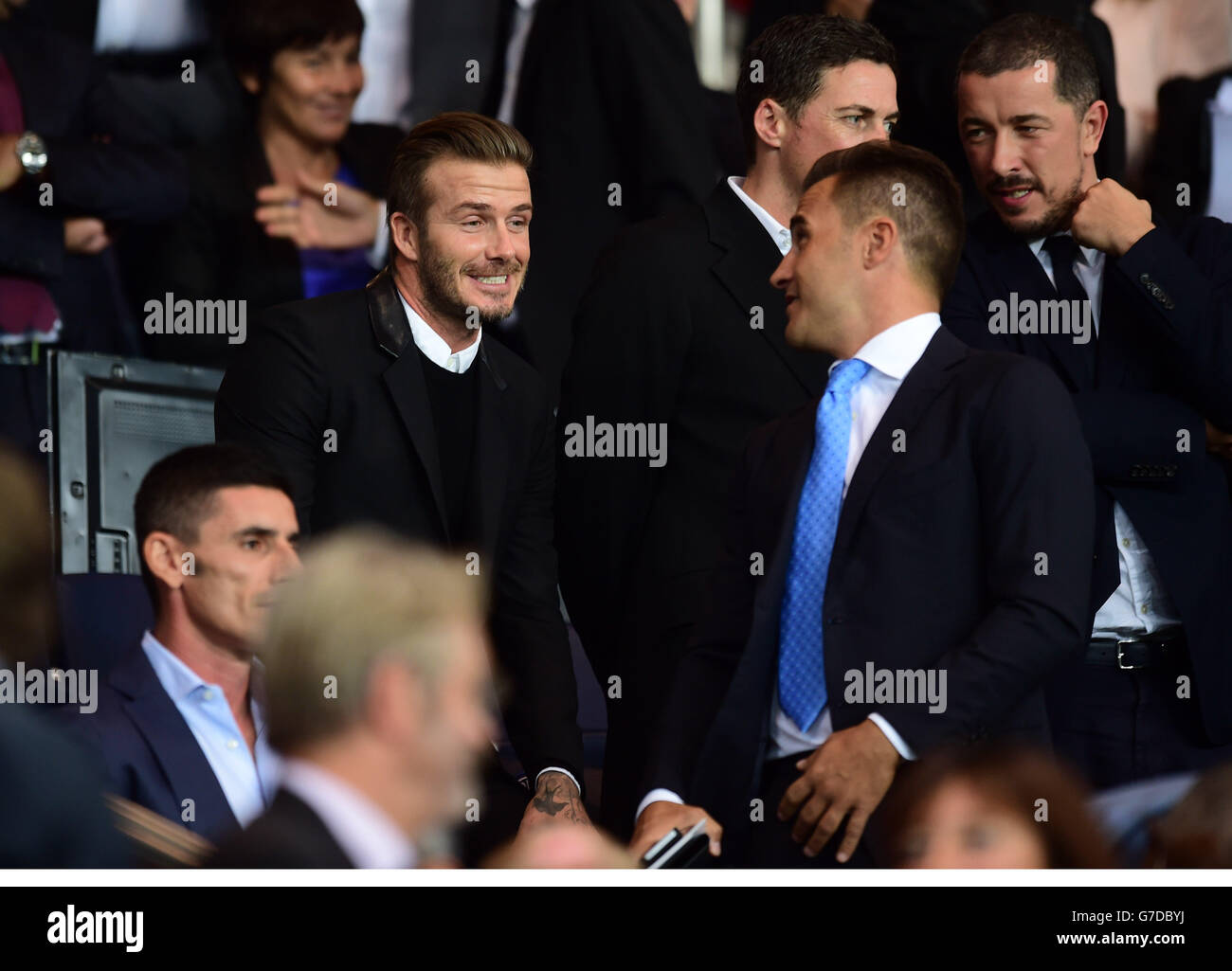 David beckham before the game between paris st germain and barcelona hi ...