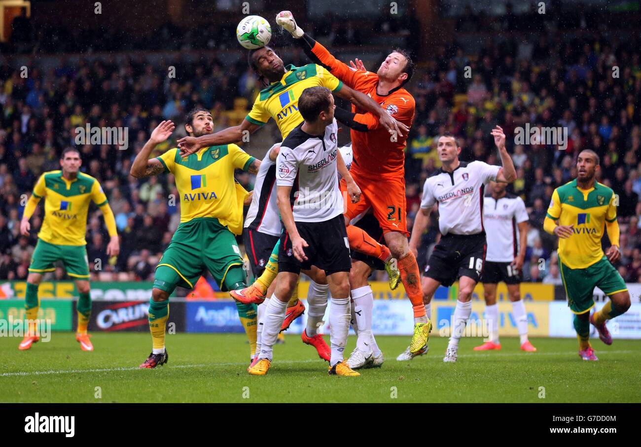 Rotherham goalkeeper Adam Collin punches the ball clear as Norwich City ...