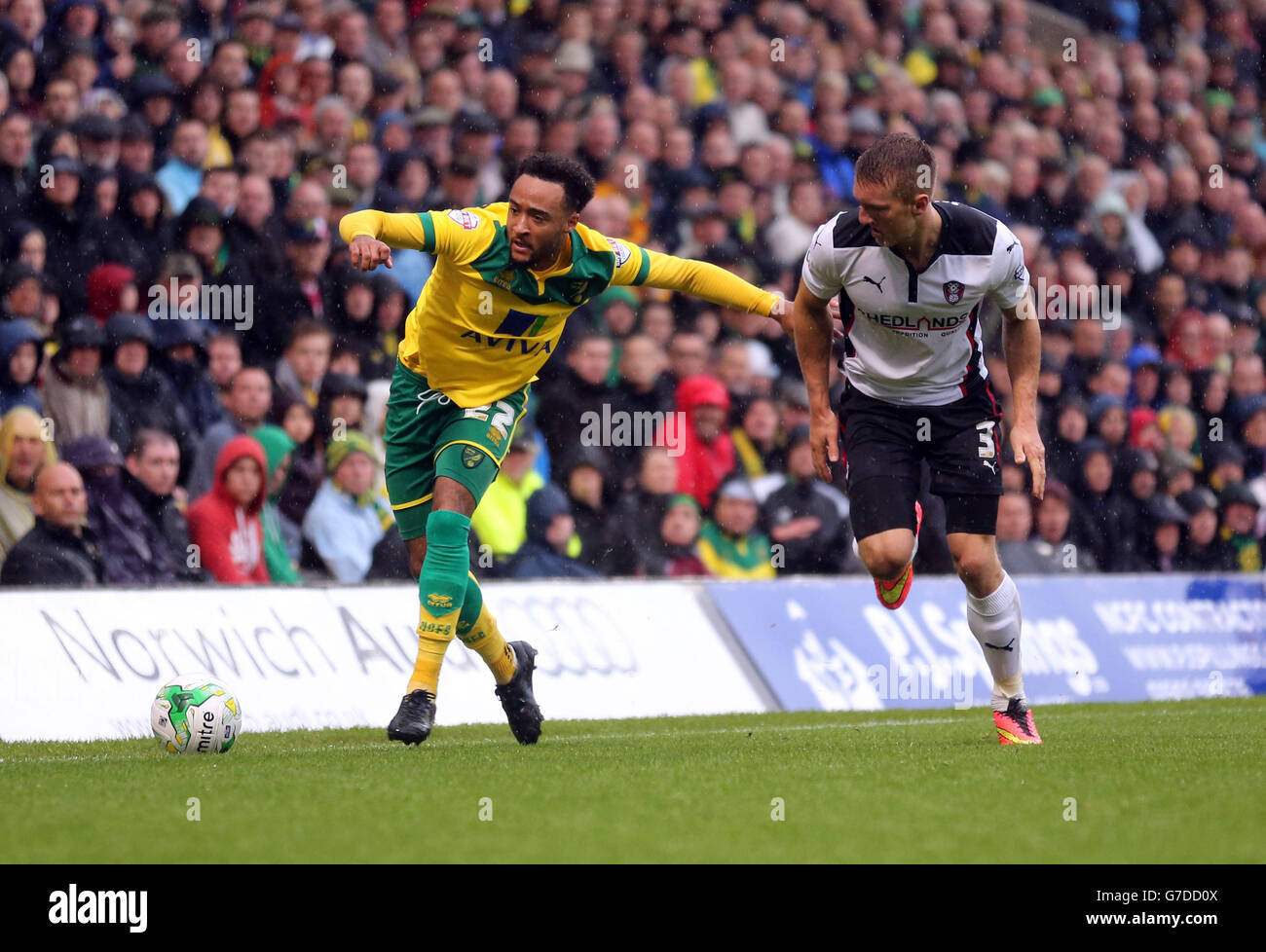 Norwich City's Nathan Redmond is challenged by Rotherham's Joe Skarz ...