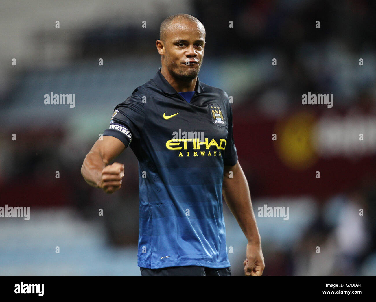 Manchester City's captain Vincent Kompany celebrates at the end of the ...