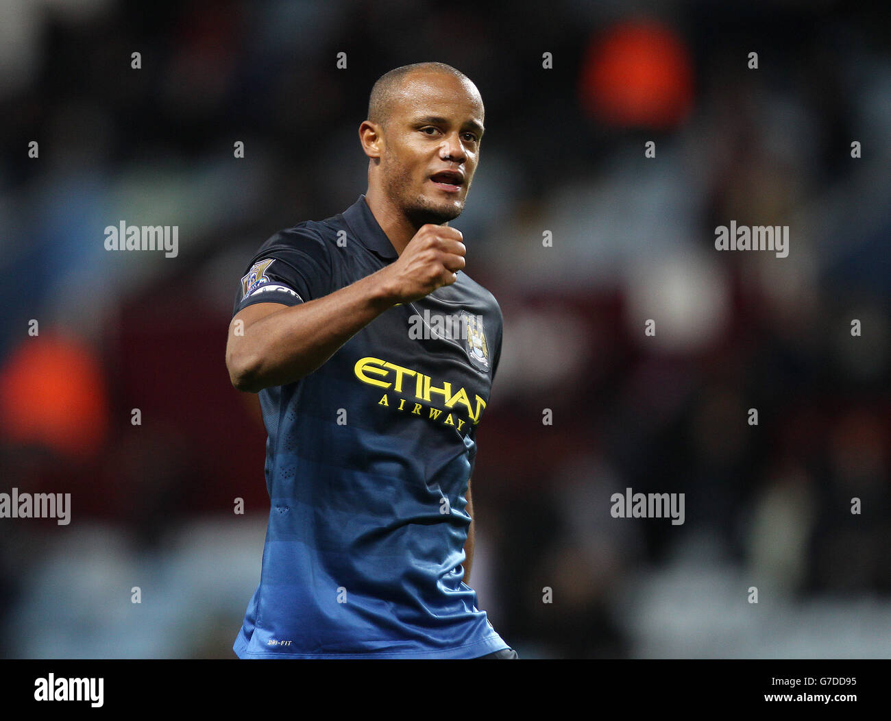 Manchester City's captain Vincent Kompany celebrates at the end of the ...