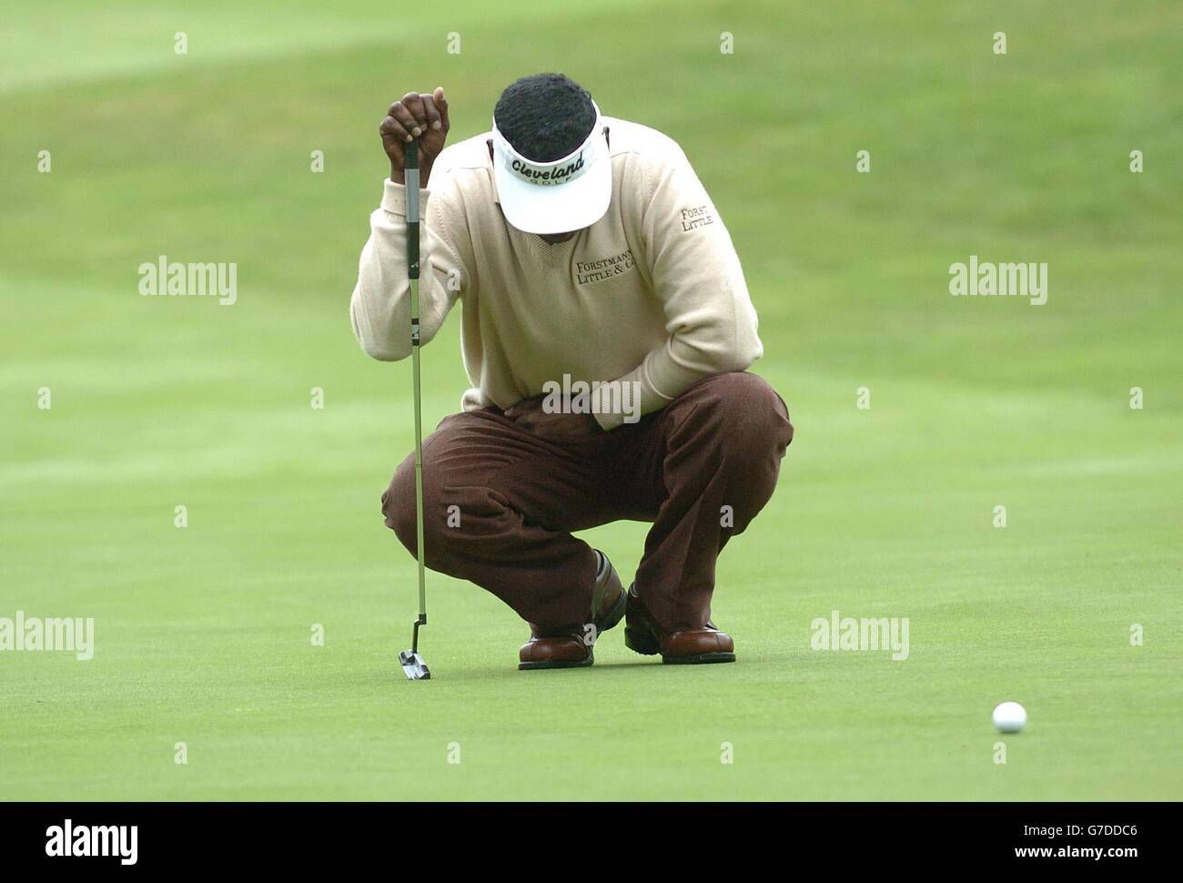 Fiji's Vijay Singh waits to putt on the 17th green, the first extra ...