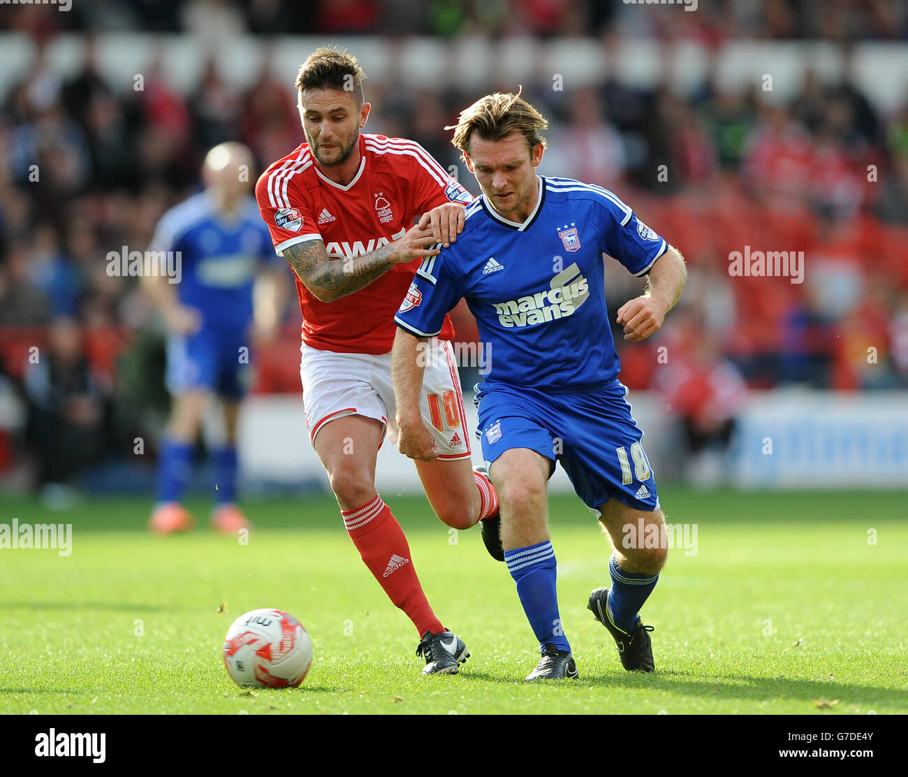 Nottingham Forest's Henri Lansbury (left) and Ipswich Town's Jay Tabb ...