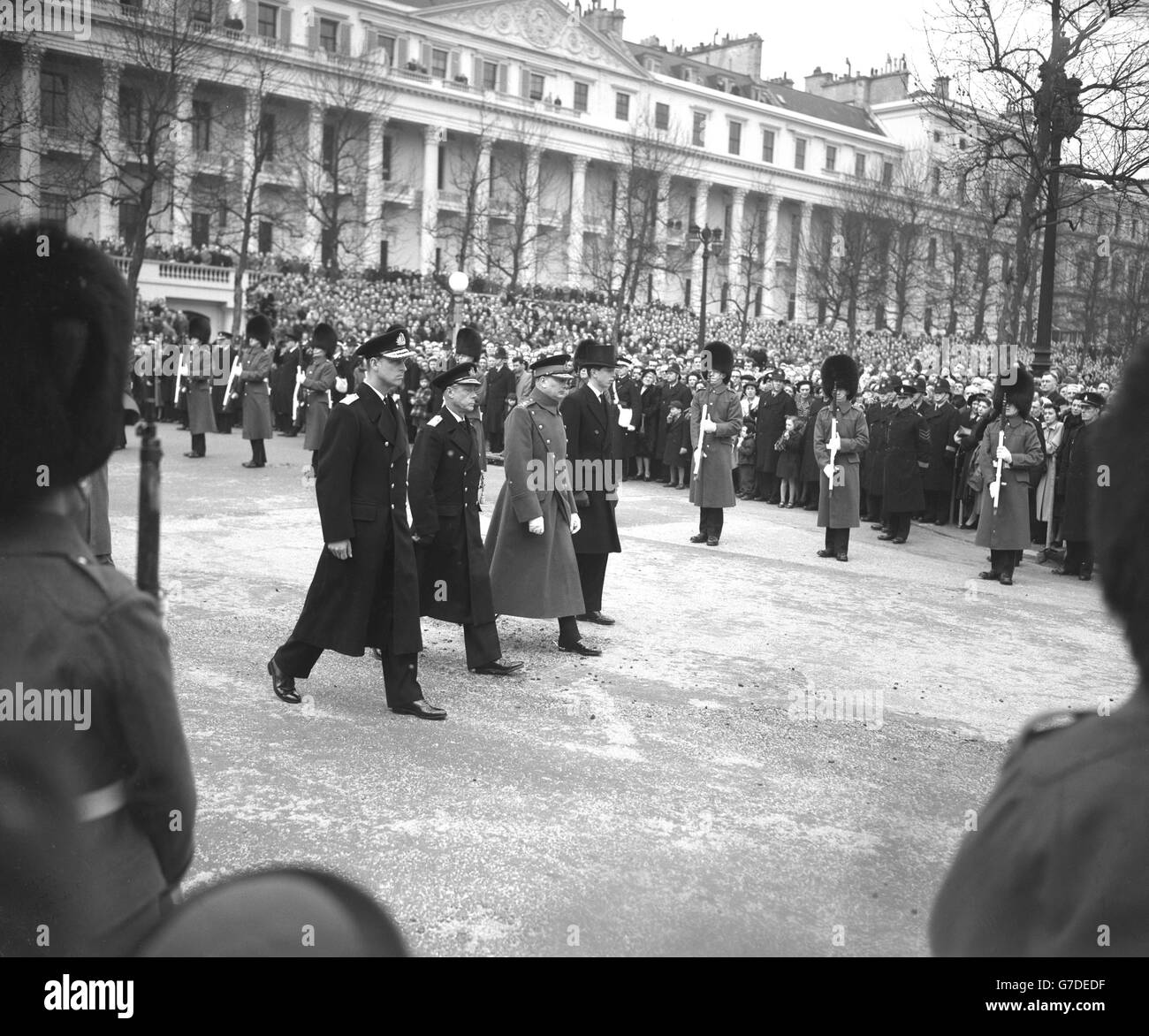 The four Royal Dukes follow the gun-carriage carrying Queen Mary's ...