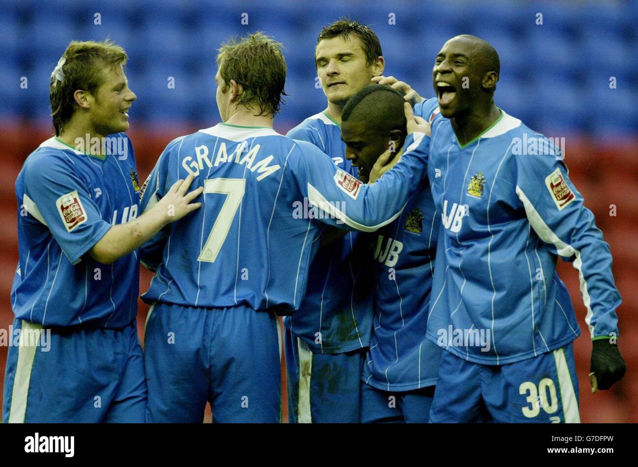 Wigan Athletic's Nathan Ellington (second from right) celebrates with ...