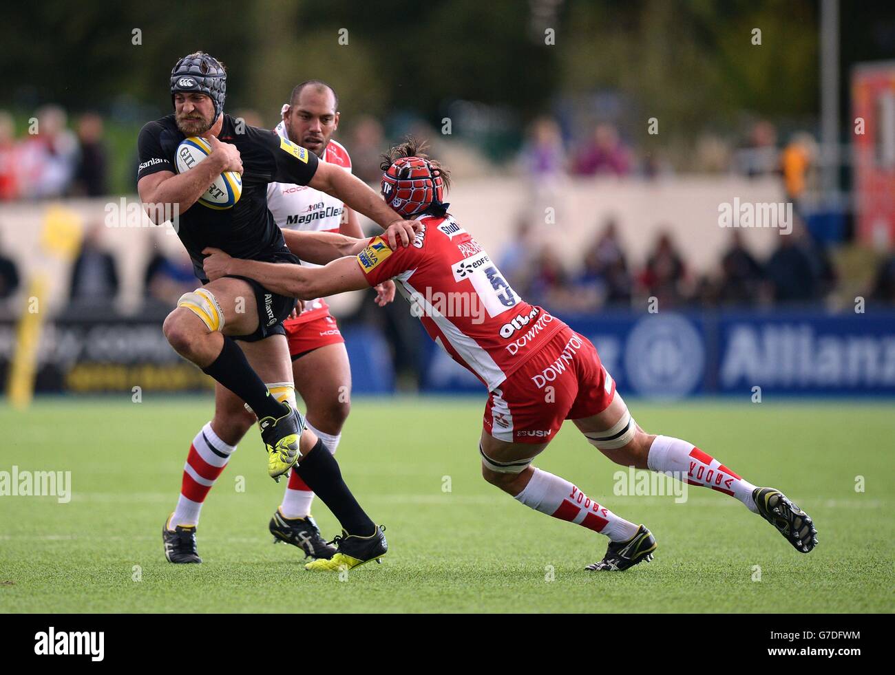 Saracens' Alistair Hargreaves hands off Gloucester Rugby's Tom Palmer ...