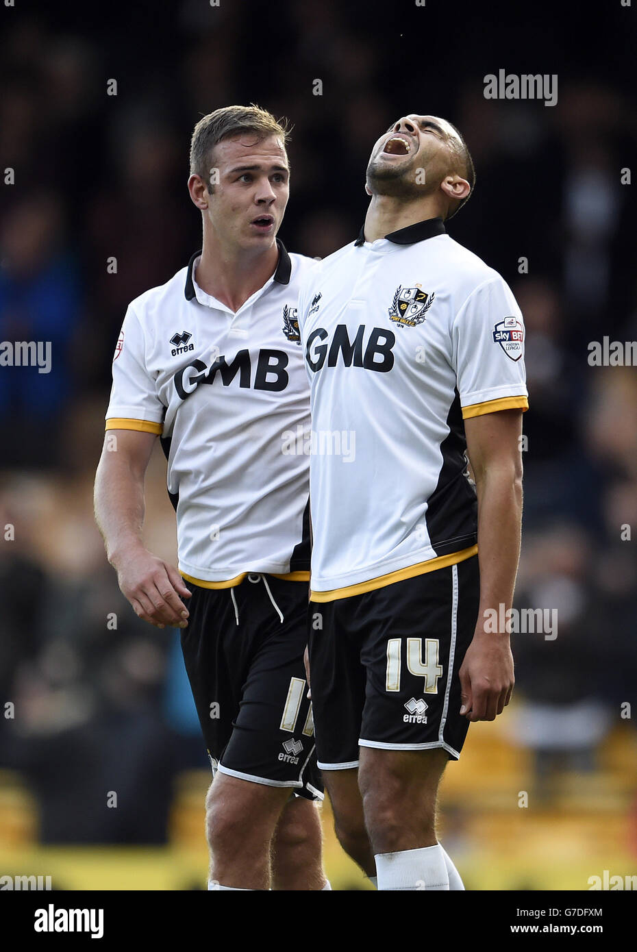 Port Vale's Colin Daniel (right) celebrates with team-mate Tom Pope ...