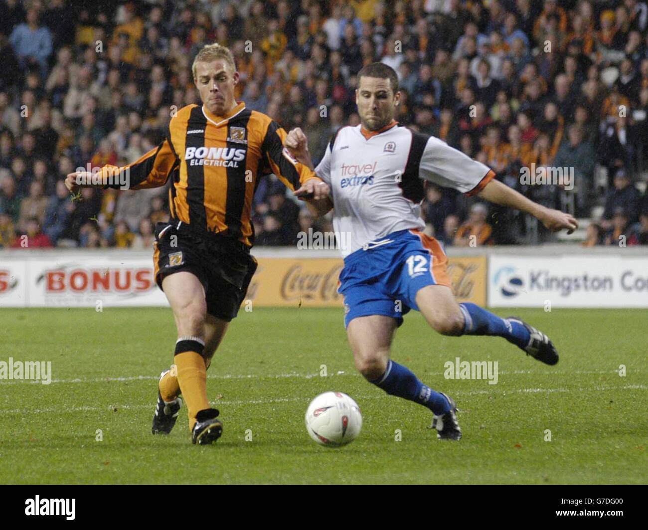 Hull City's Danny Allsopp (l) and Luton Town's Chris Coyne in action ...