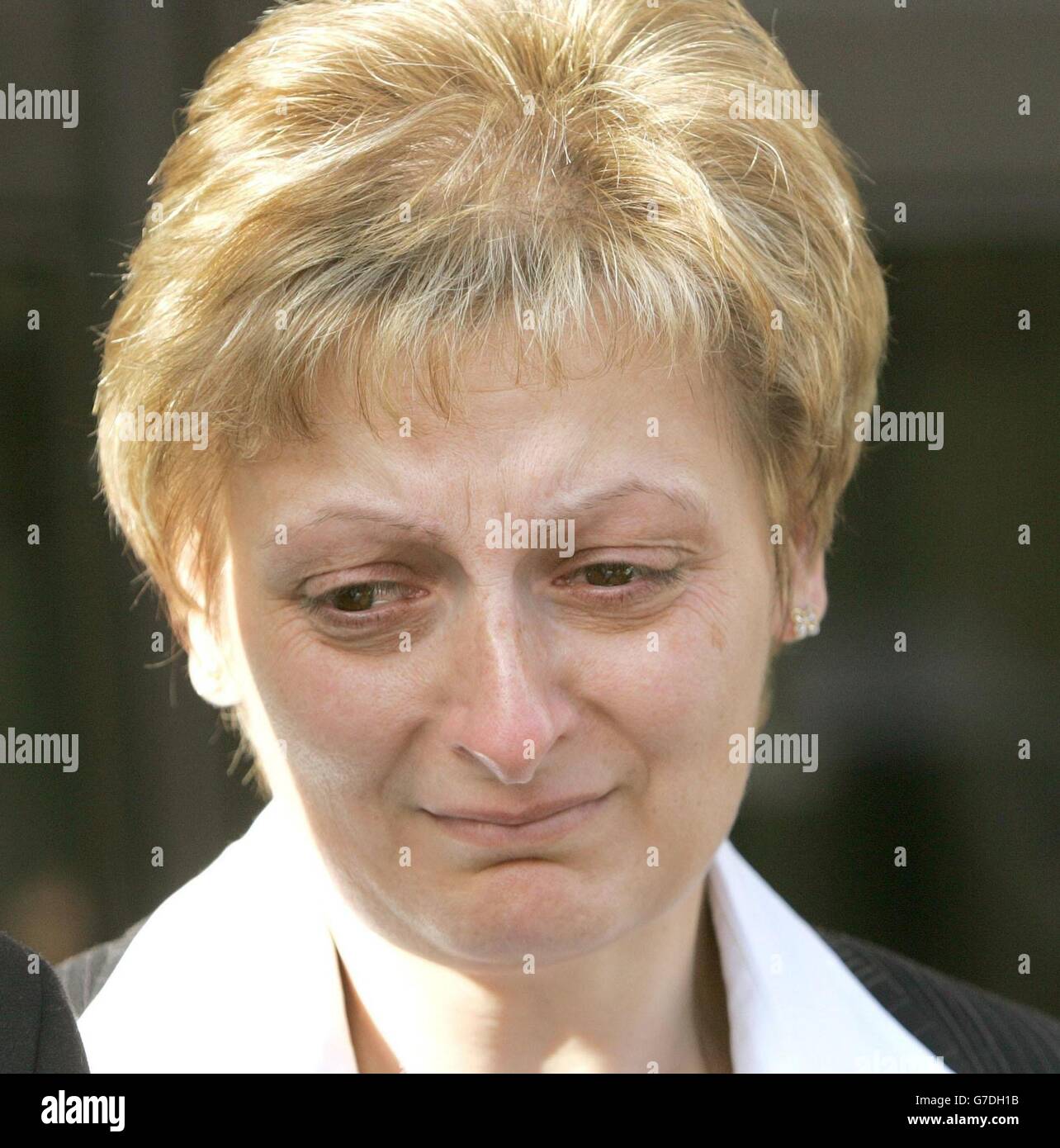 A tearful Mrs Susan Jones outside Oxford Croun Court as she listens to ...