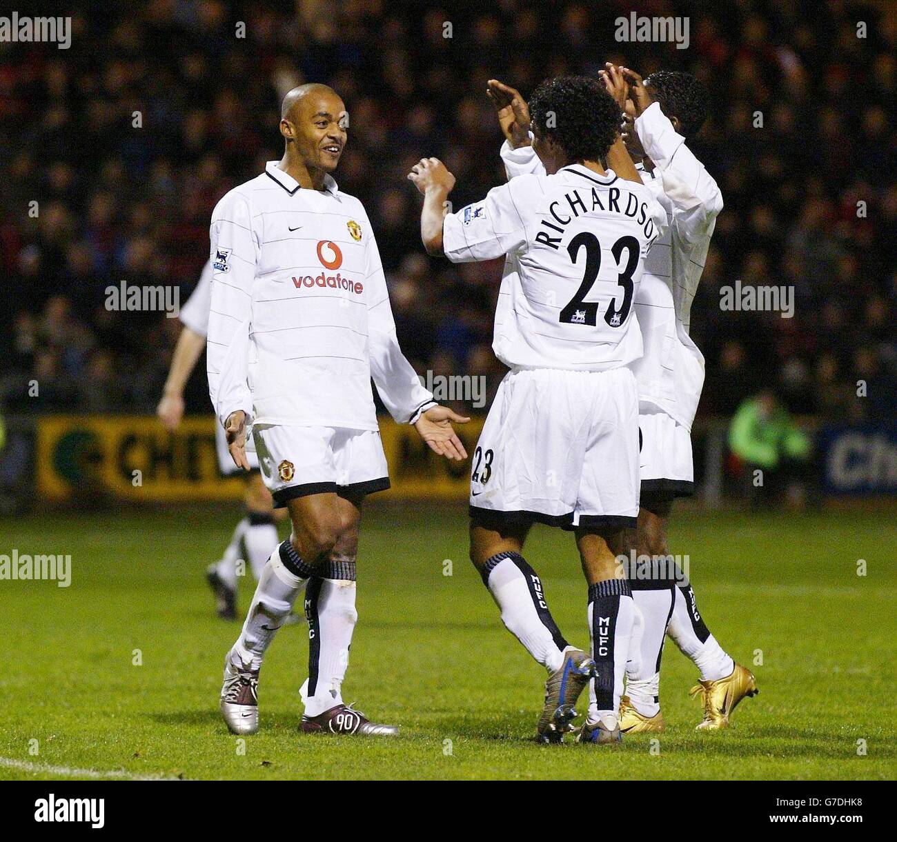 Manchester United's David Bellion (left), Louis Saha and Kieran ...
