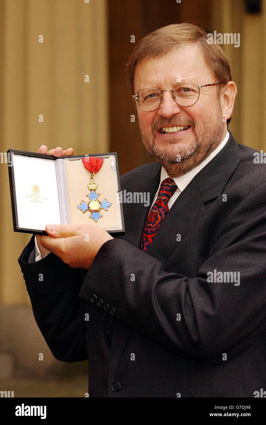 Geoff Elliott with his CBE (Commander of the British Empire) CBE after ...
