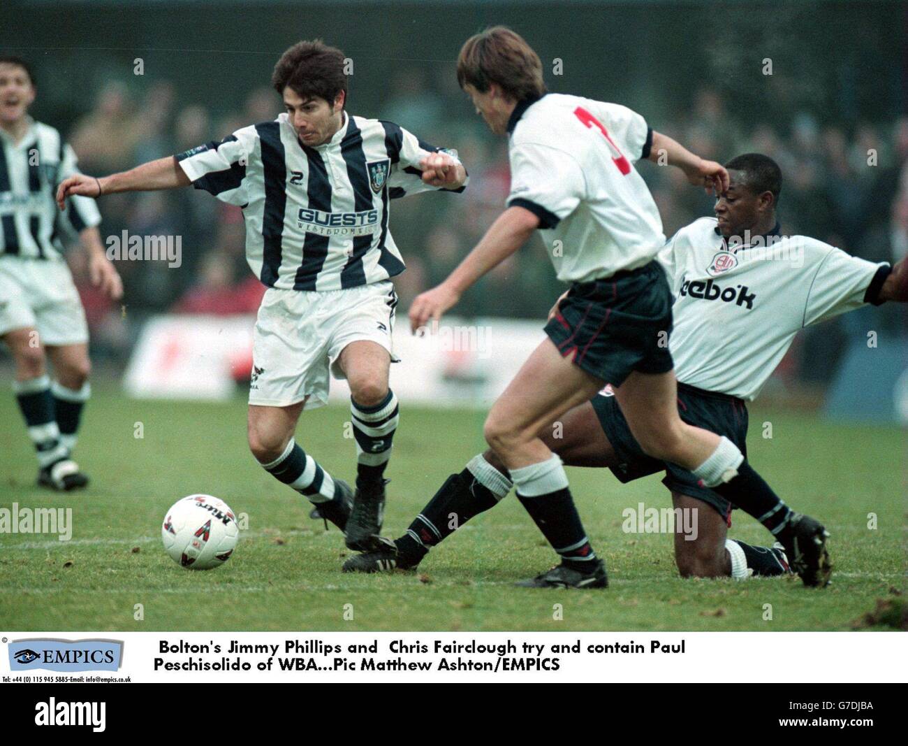 Bolton's Jimmy Phillips and Chris Fairclough try and contain Paul ...