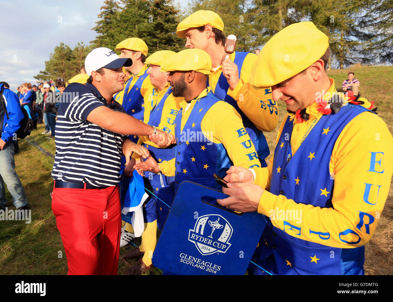 USA's Patrick Reed shakes hands with some Europe fans during the ...