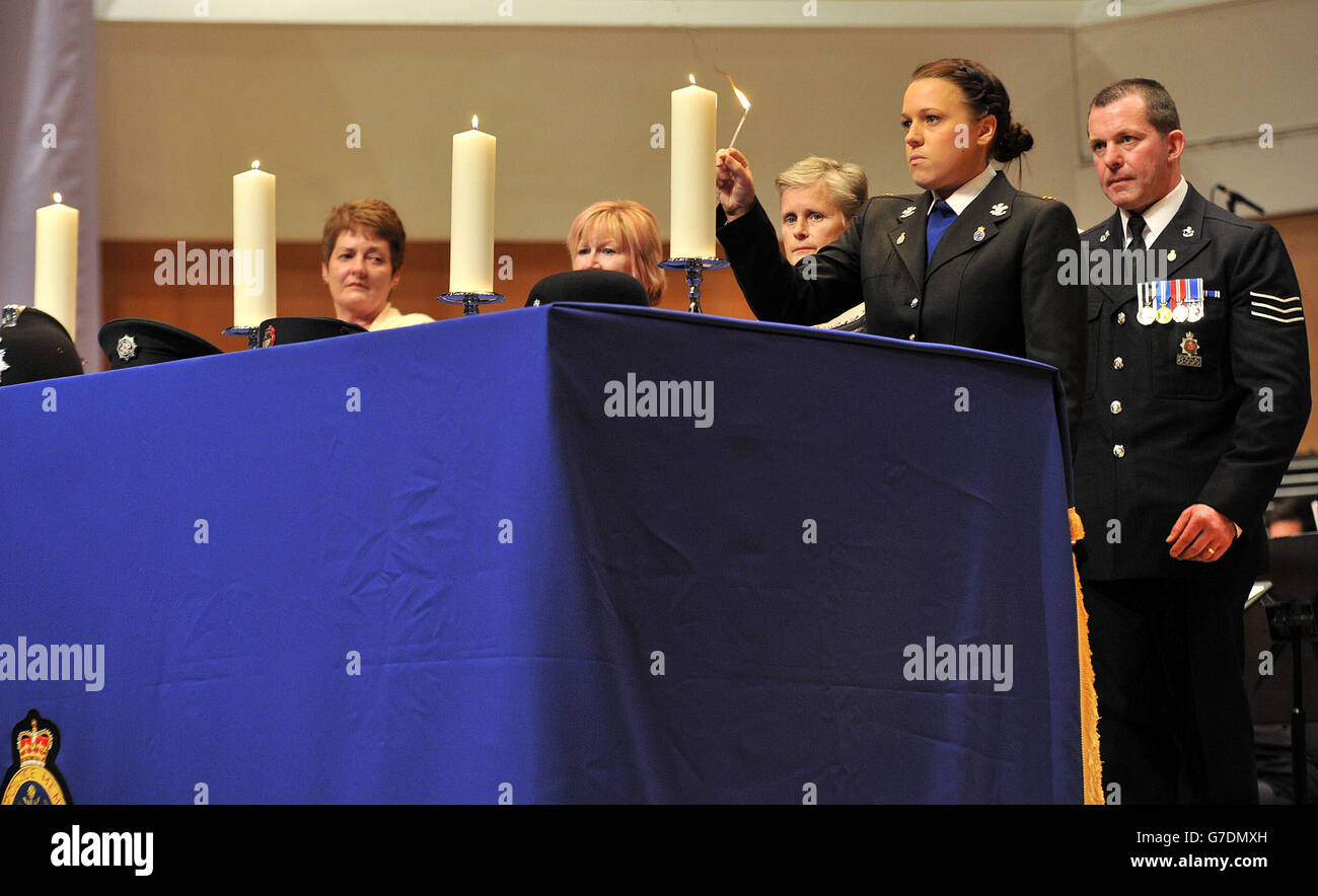 Lowri Davies the daughter of Constable Terence John Davies lights a ...