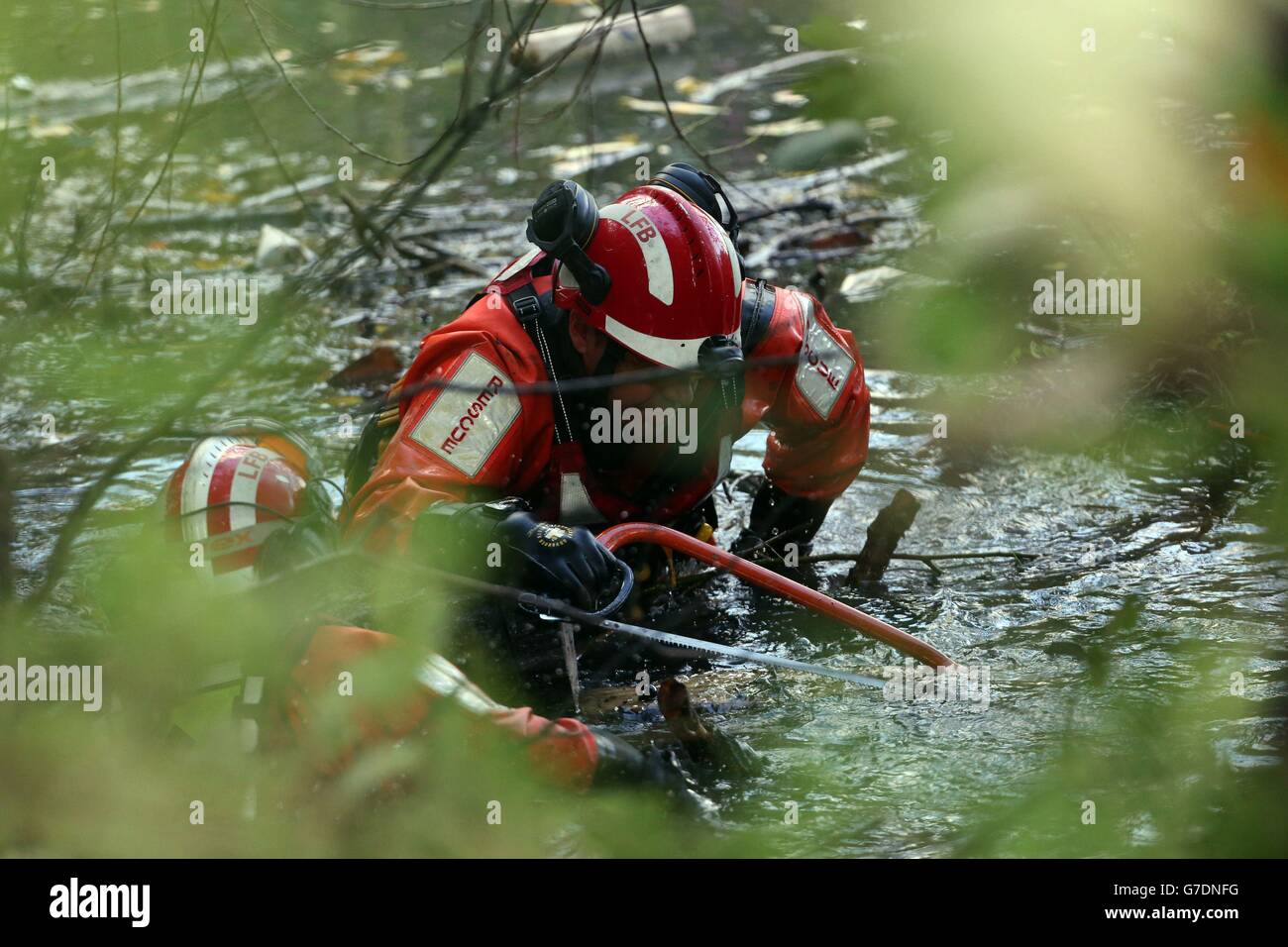 Specialists from the London Fire Brigade Urban Search and Rescue team ...