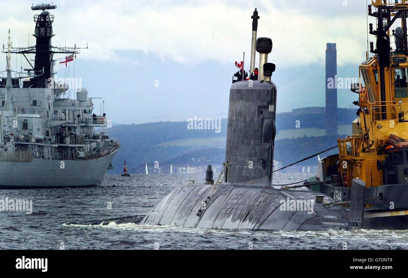 HMCS Chicoutimi, the Canadian submarine is towed down the Clyde to HM ...