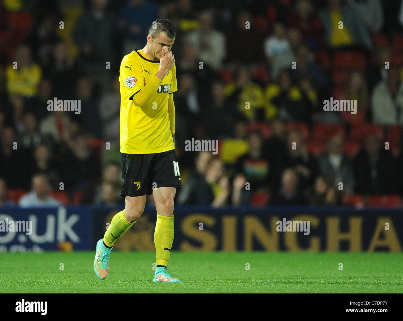 Watford's Daniel Pudil walks off after being shown a red card against ...