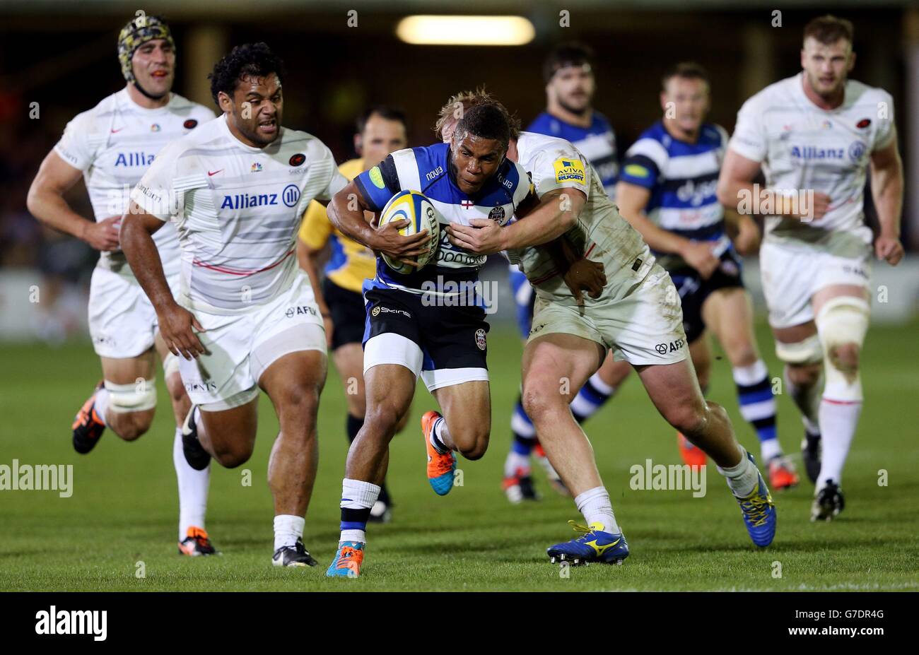 Bath's Kyle Eastman beats the tackle of Saracens Rhys Gill during the ...