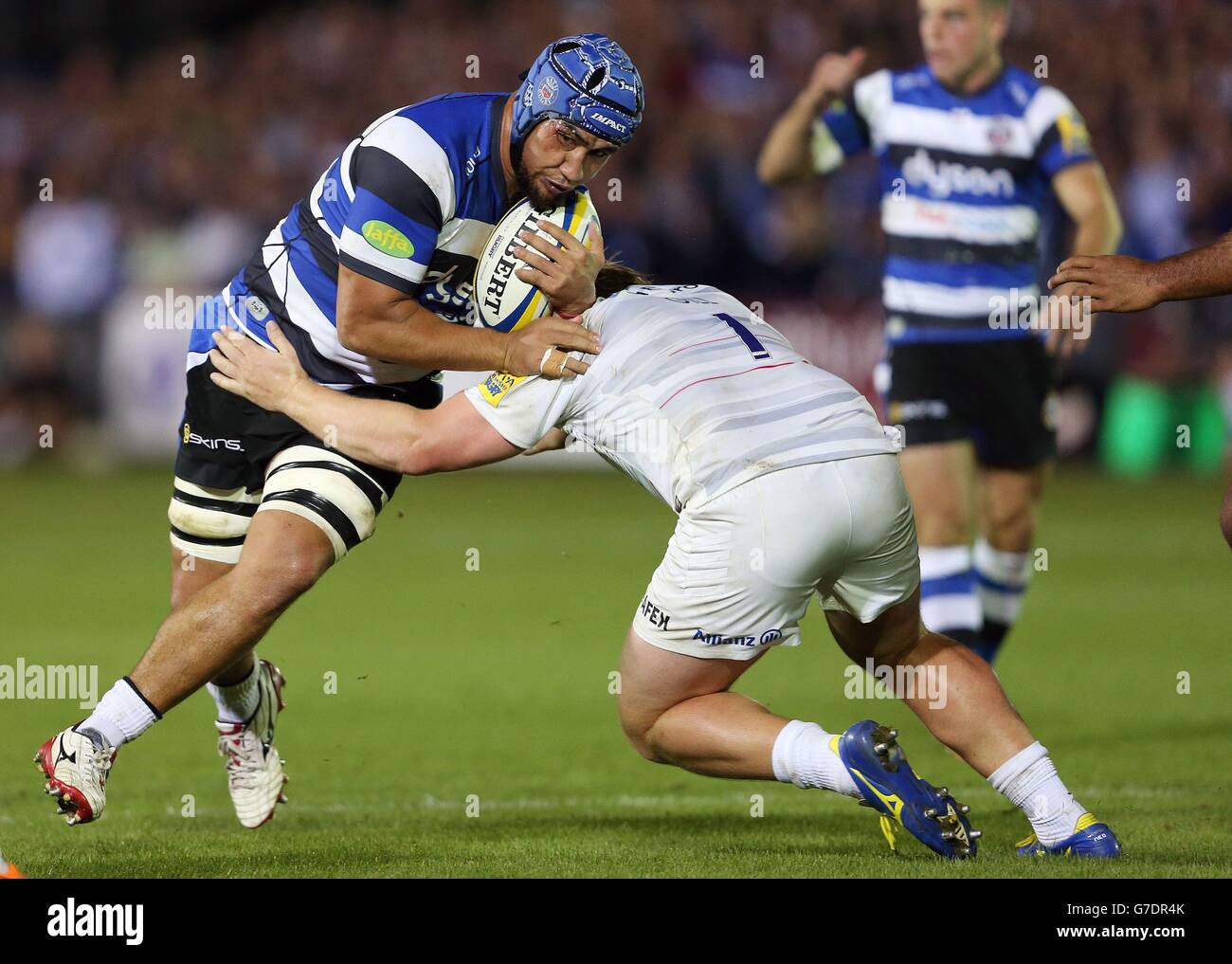 Bath's Leroy Houston is tackle by Saracens Rhys Gill during the Aviva ...