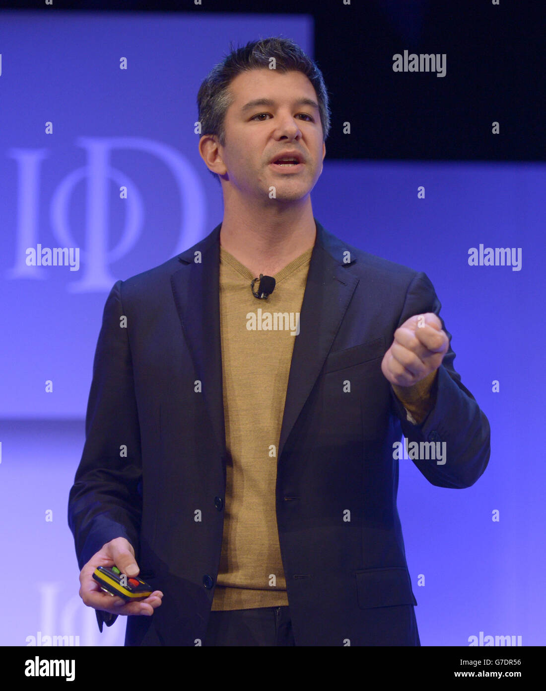 Travis Kalanick, CEO and founder of Uber, speaks during the Institute ...