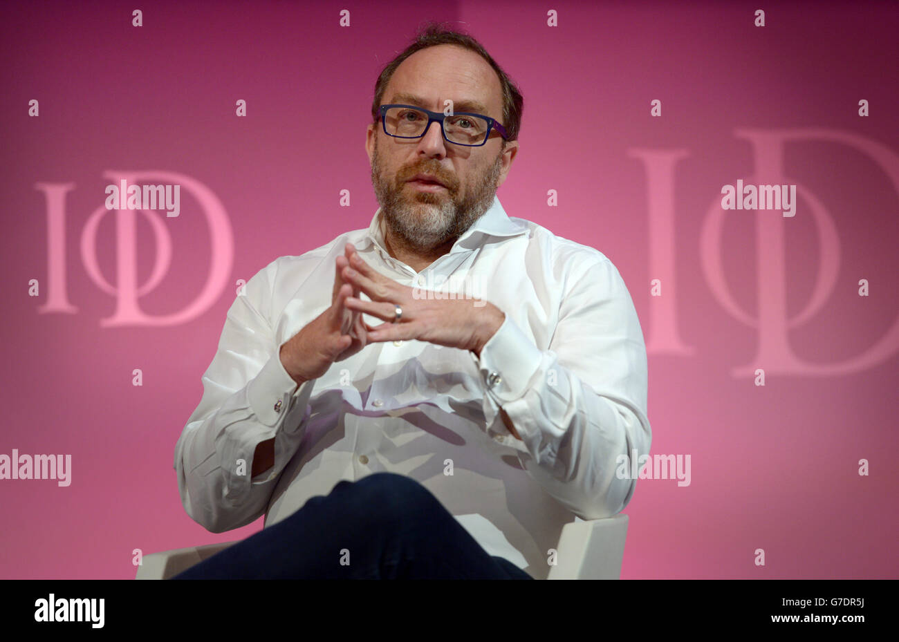 Jimmy Wales, founder of Wikipedia, speaks during the Institute of ...