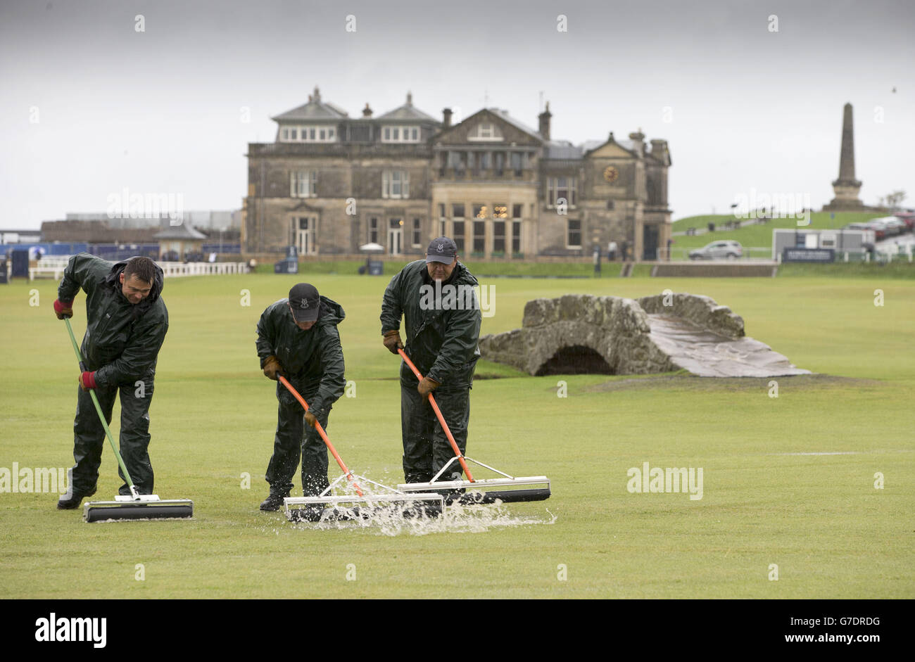 Green-keeping staff battle with the elements to get the old course ...
