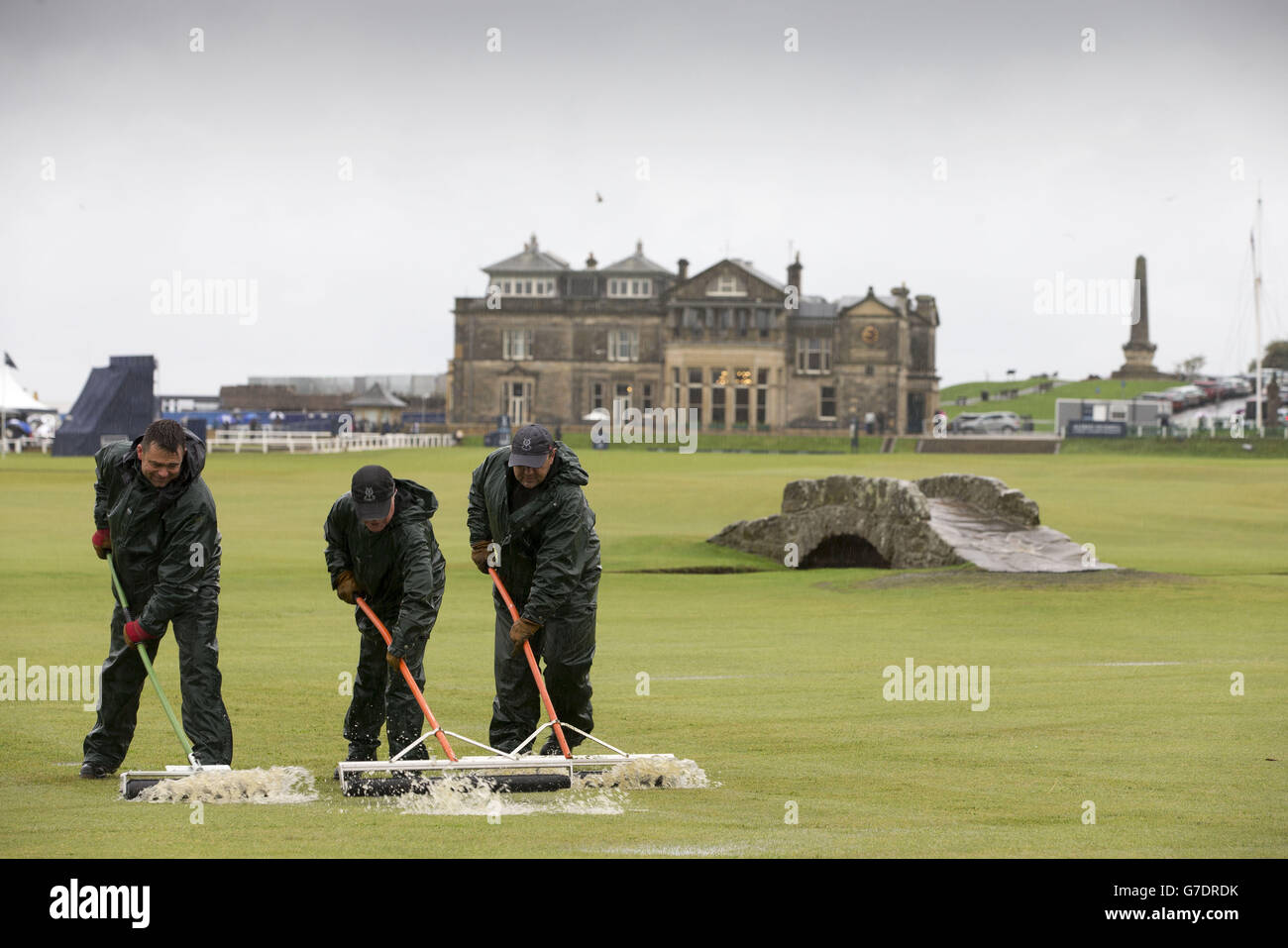 Green-keeping staff battle with the elements to get the old course ...
