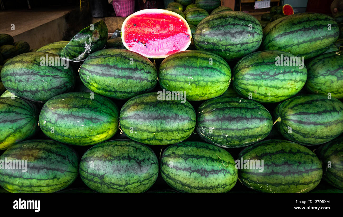 Many big sweet green watermelons background Stock Photo - Alamy