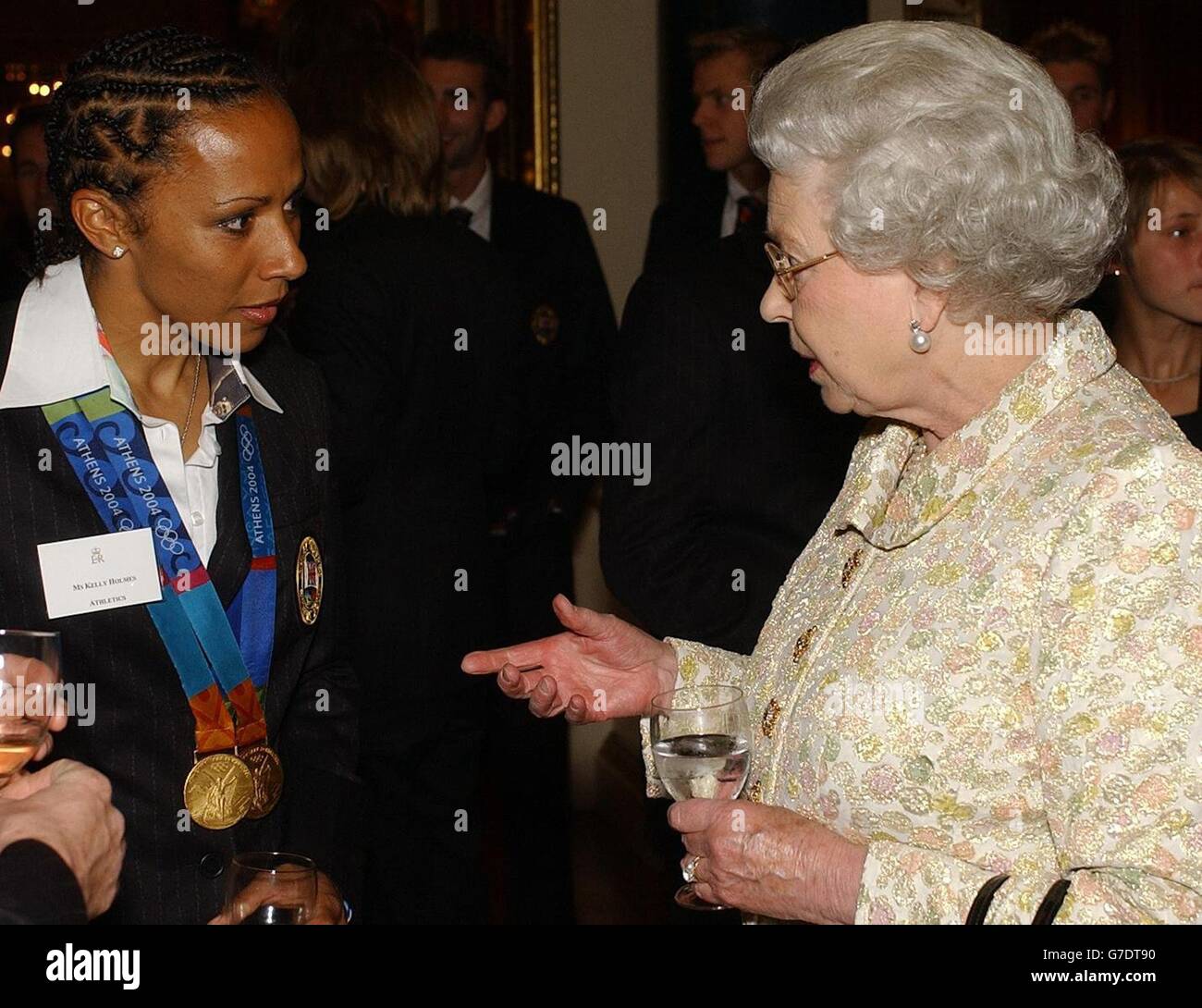 Royal Olympic Reception. Britain's Queen Elizabeth II talks to Kelly ...