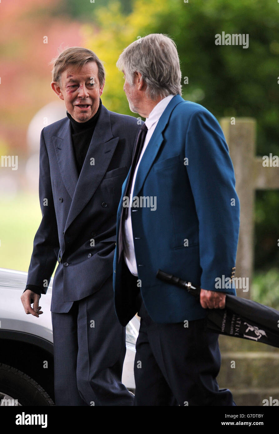 Henry Kelly (left) talks with Ed 'Stewpot' Stewart as they leave ...