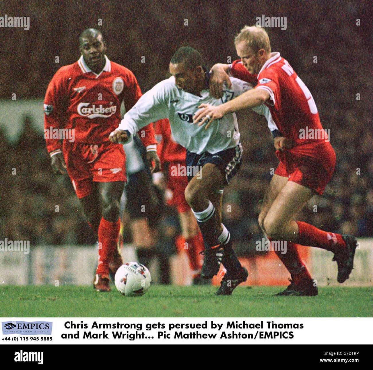 Chris Armstrong is persued by Michael Thomas and Mark Wright Stock ...