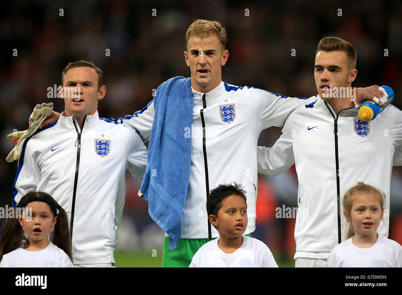 (left to right) England's Wayne Rooney, Joe Hart and Calum Chambers ...