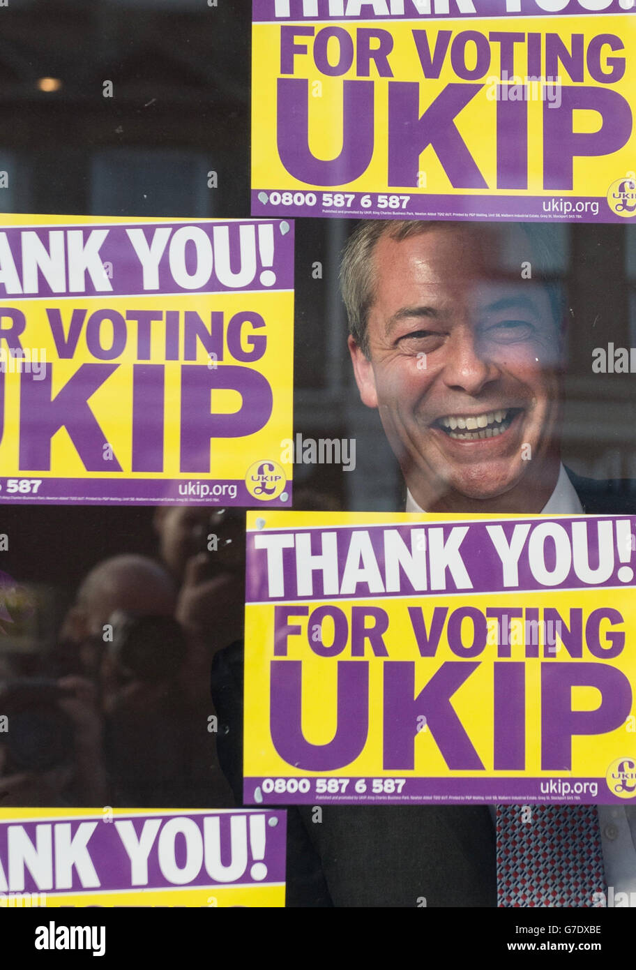 UKIP leader Nigel Farage looks out of the window of the UKIP campaign ...