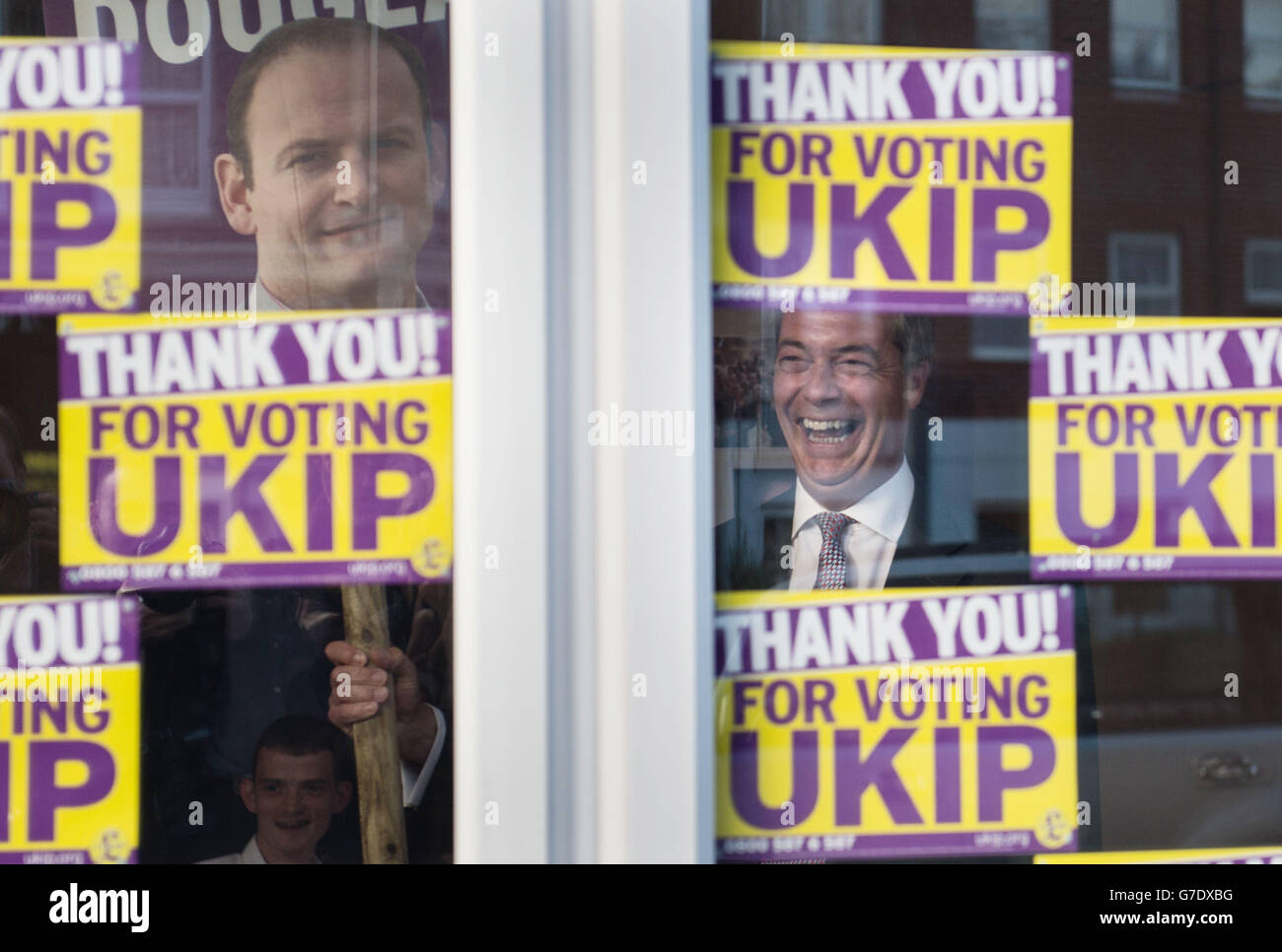 UKIP leader Nigel Farage looks out of the window of the UKIP campaign ...