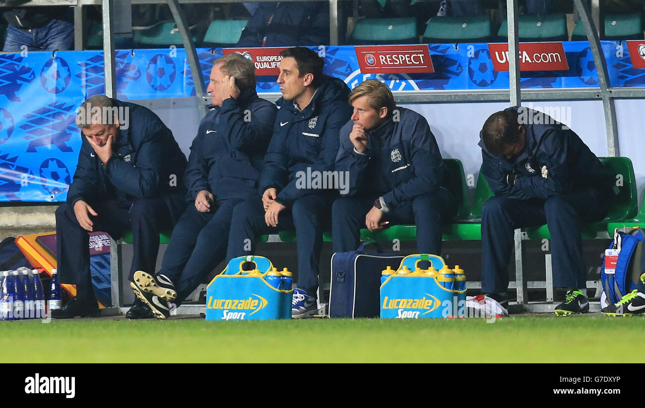 England manager Roy Hodgson (left) sats on the bench with the rest of ...