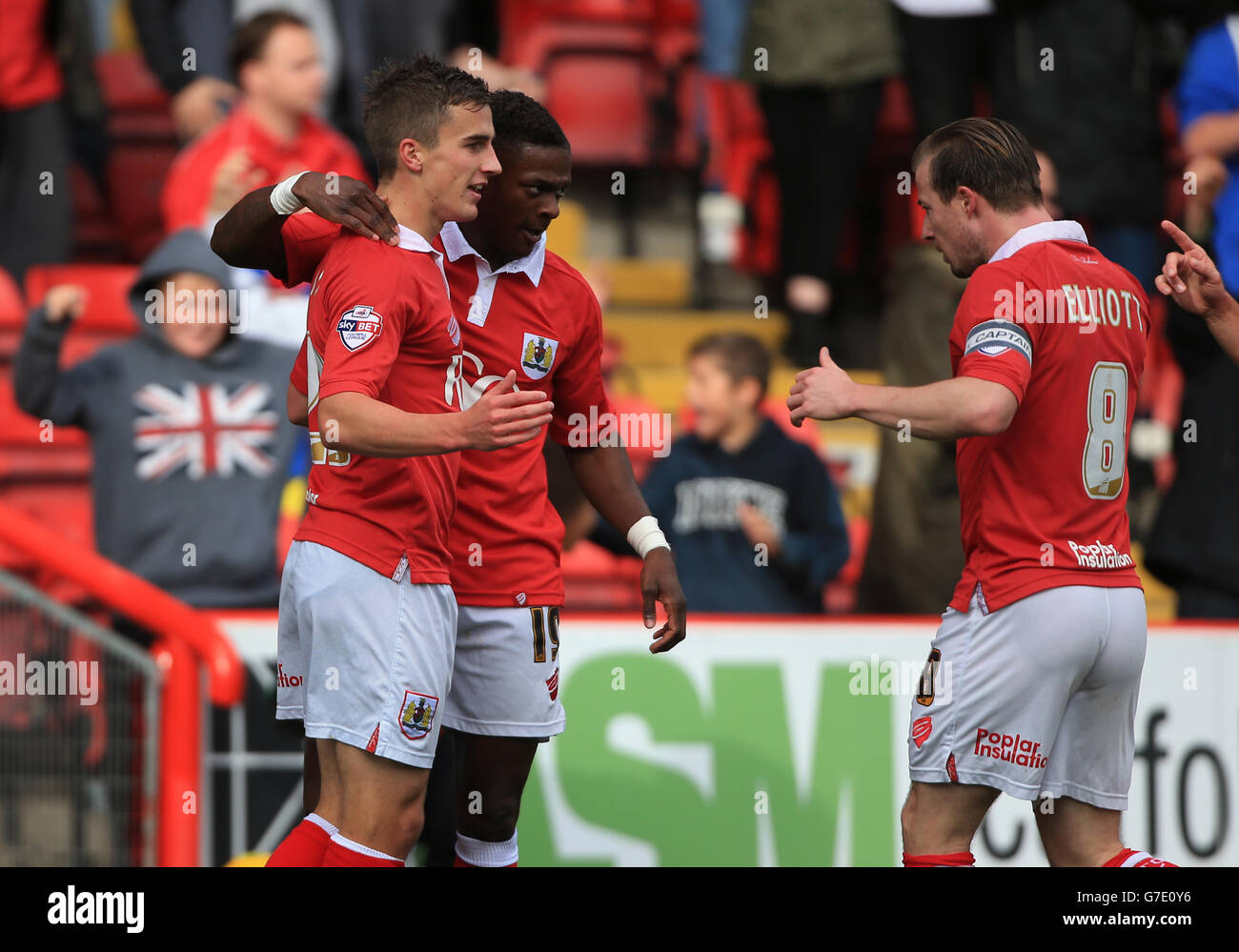 Bristol City's Joe Bryan (left) celebrates with Kieran Agard and Wade ...