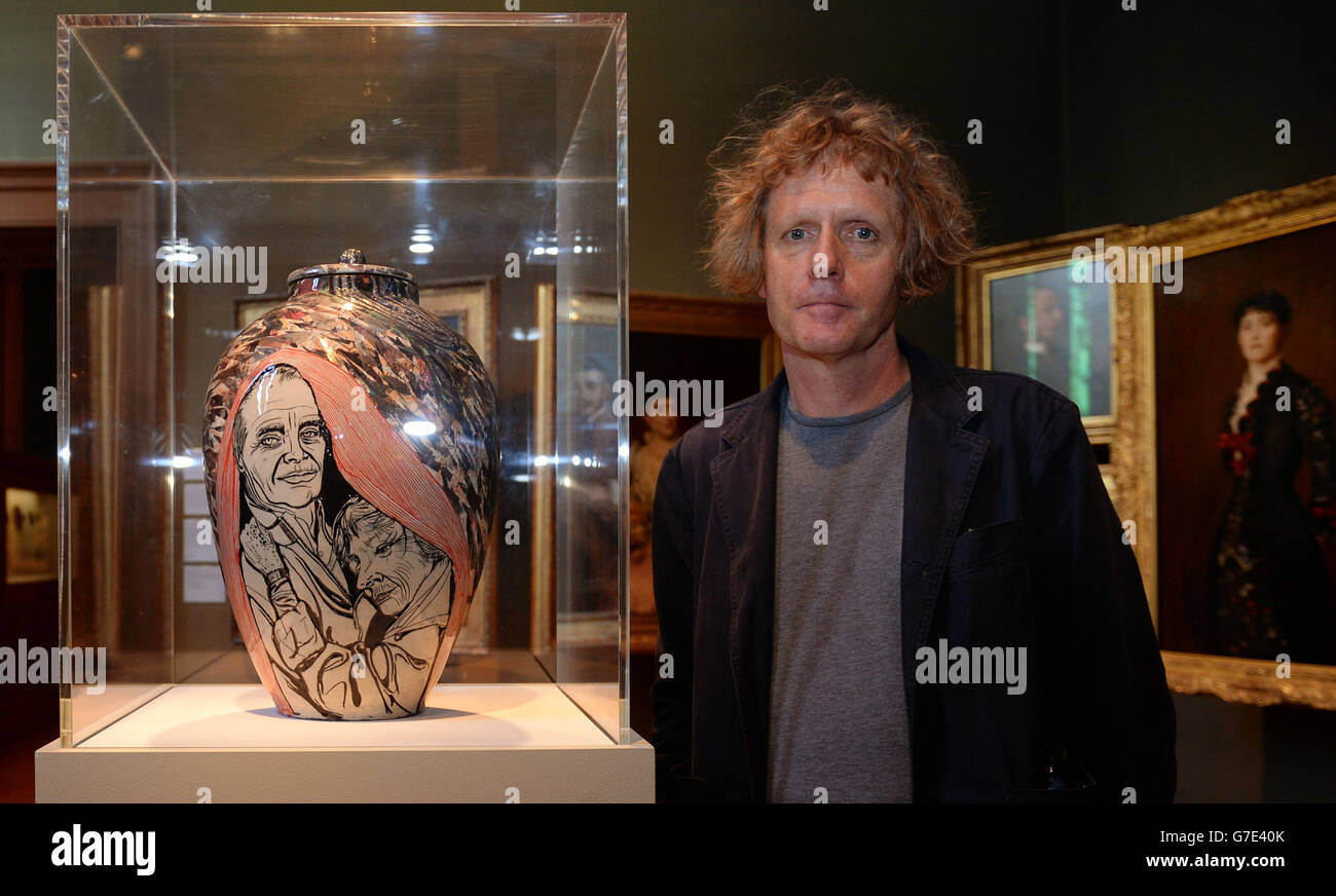 Grayson Perry poses beside 'Memory Jar' during a photocall for his ...