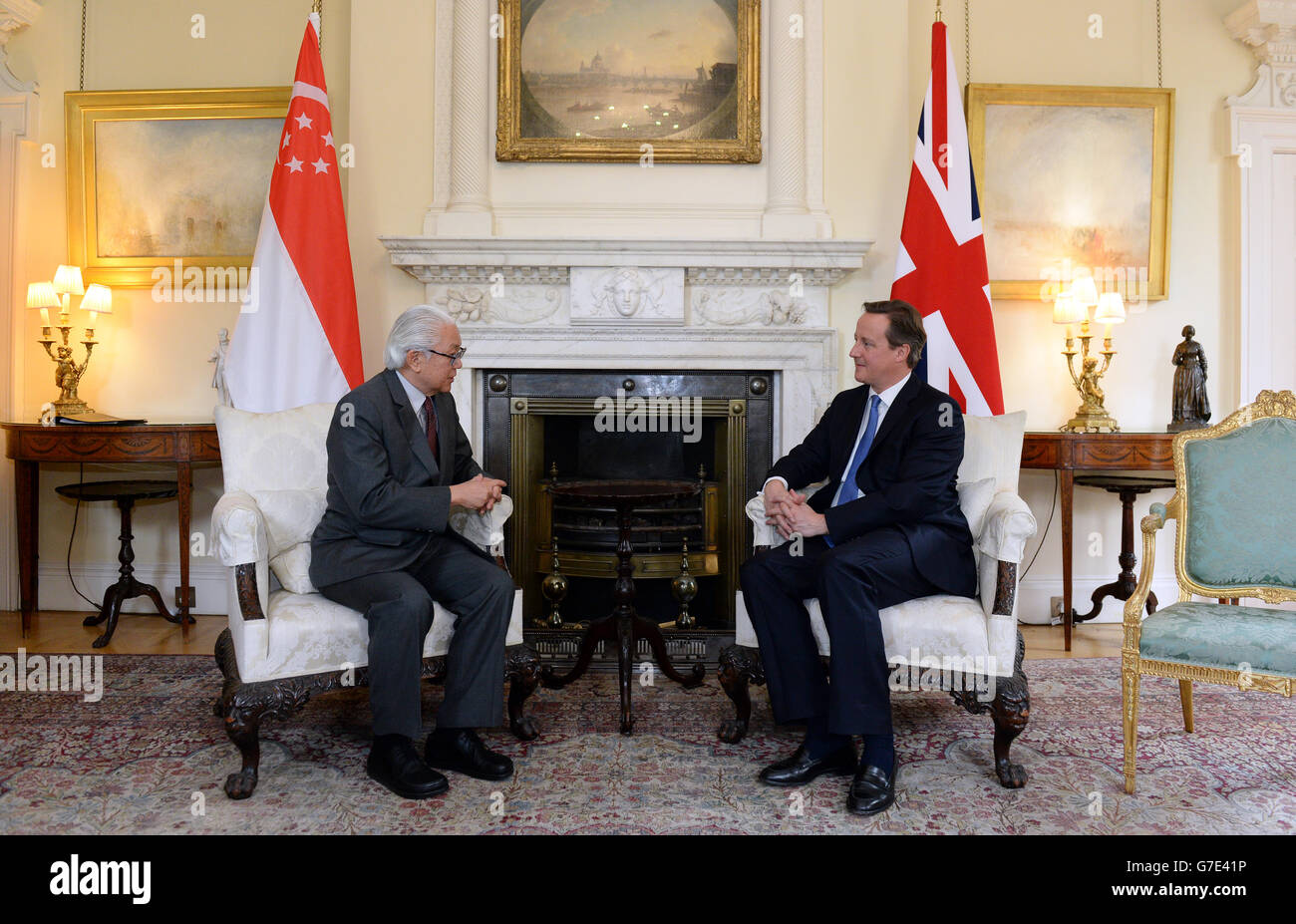 Prime Minister David Cameron greets the President of Singapore Tony Tan ...