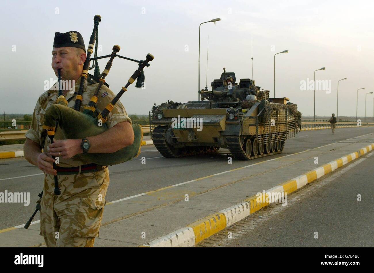 Pipe Major Scott Taylor, 34, from Glasgow, plays his bagpipes as he ...